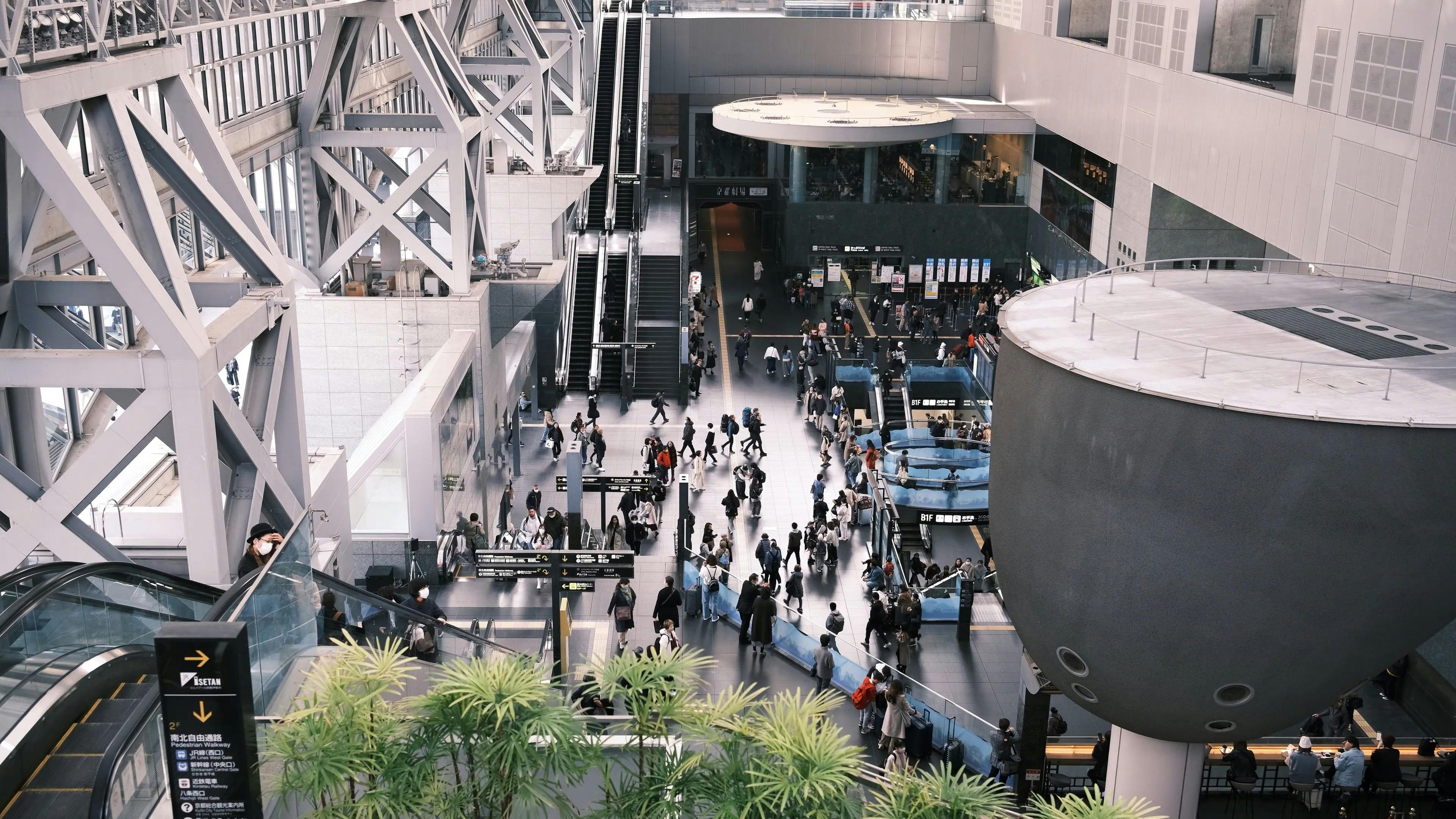 A large indoor space with people walking around Free Stock Video ...