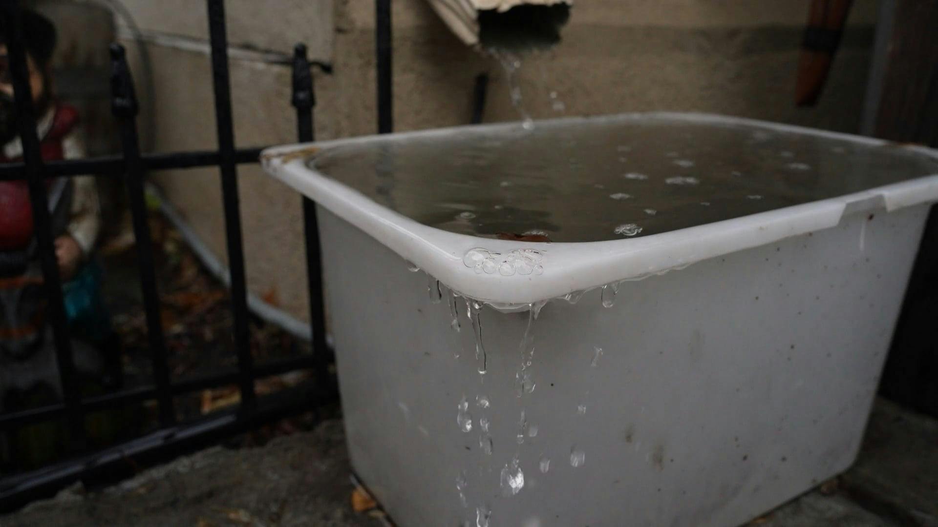 A water container sits outside a house Free Stock Video Footage ...