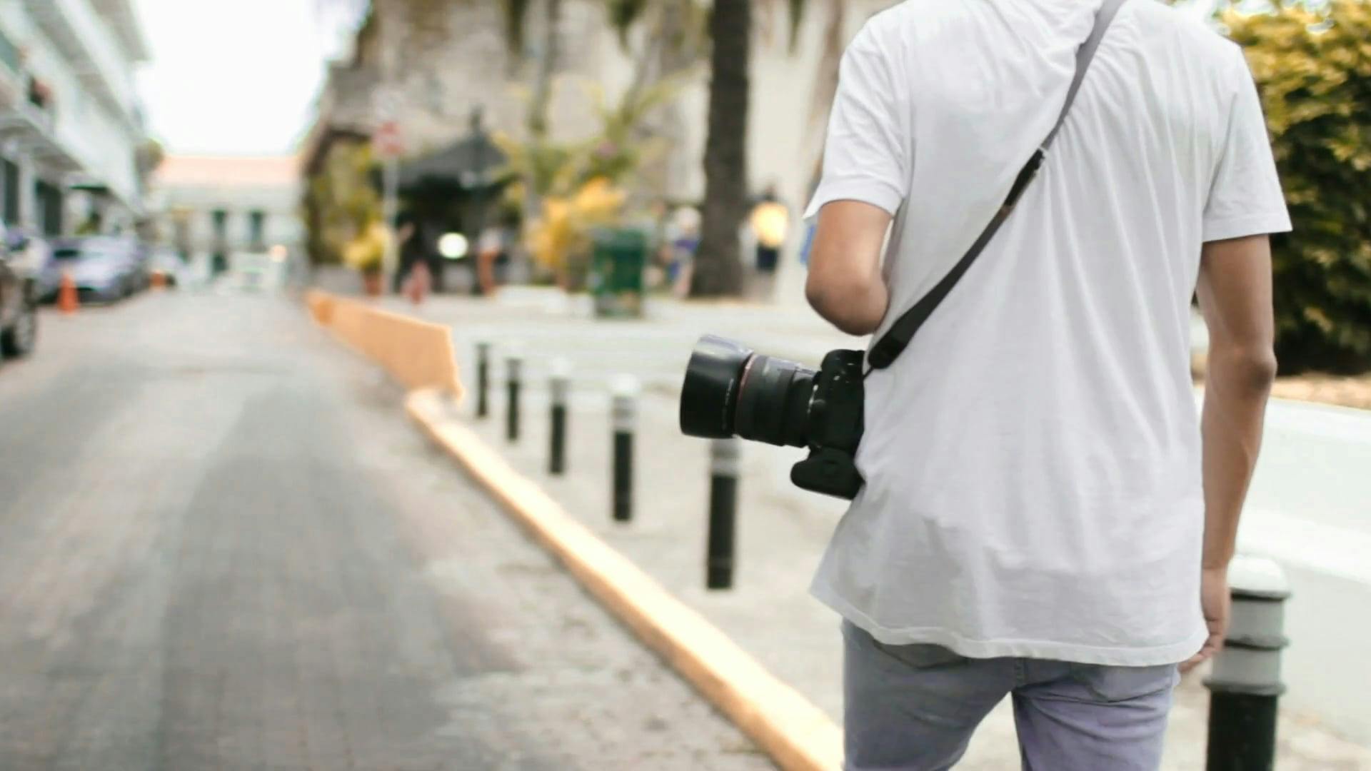 Man Walking With A Camera Free Stock Video Footage, Royalty-Free 4K ...