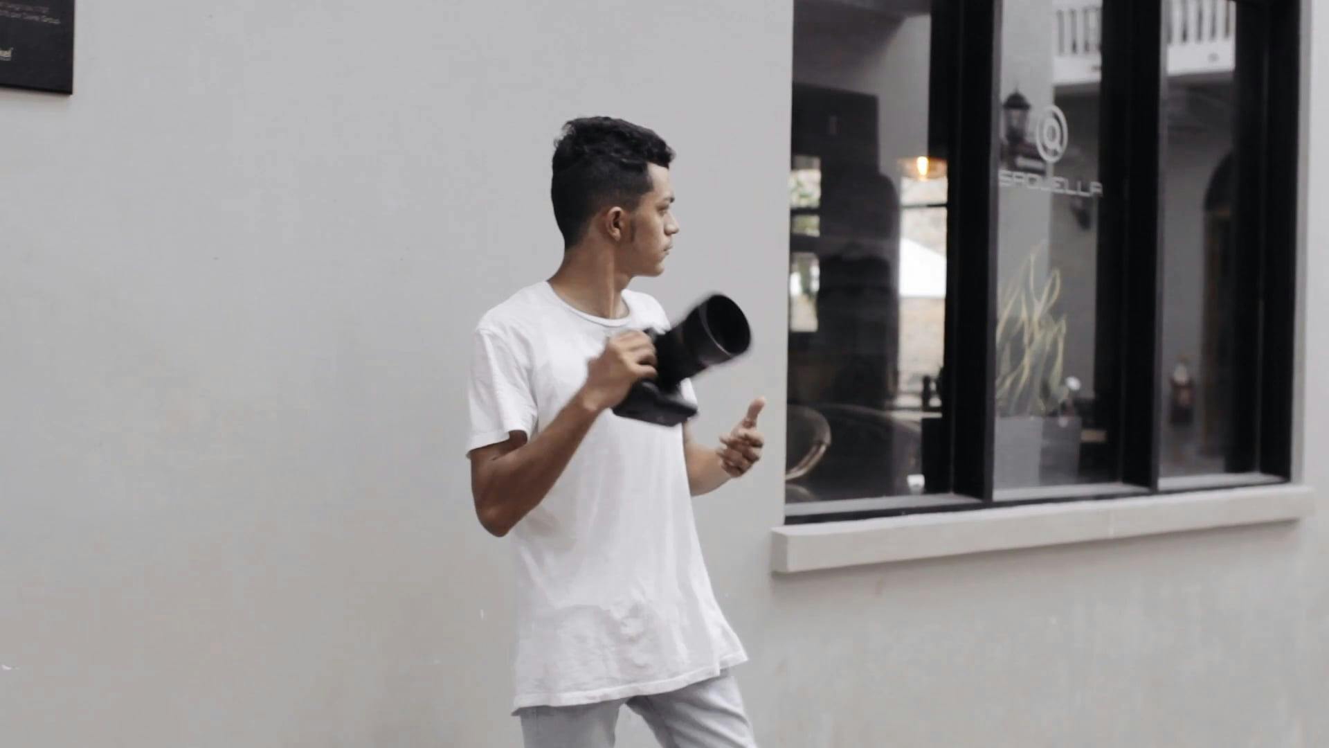 Low Angle Shot Of A Woman Taking Photo · Free Stock Video