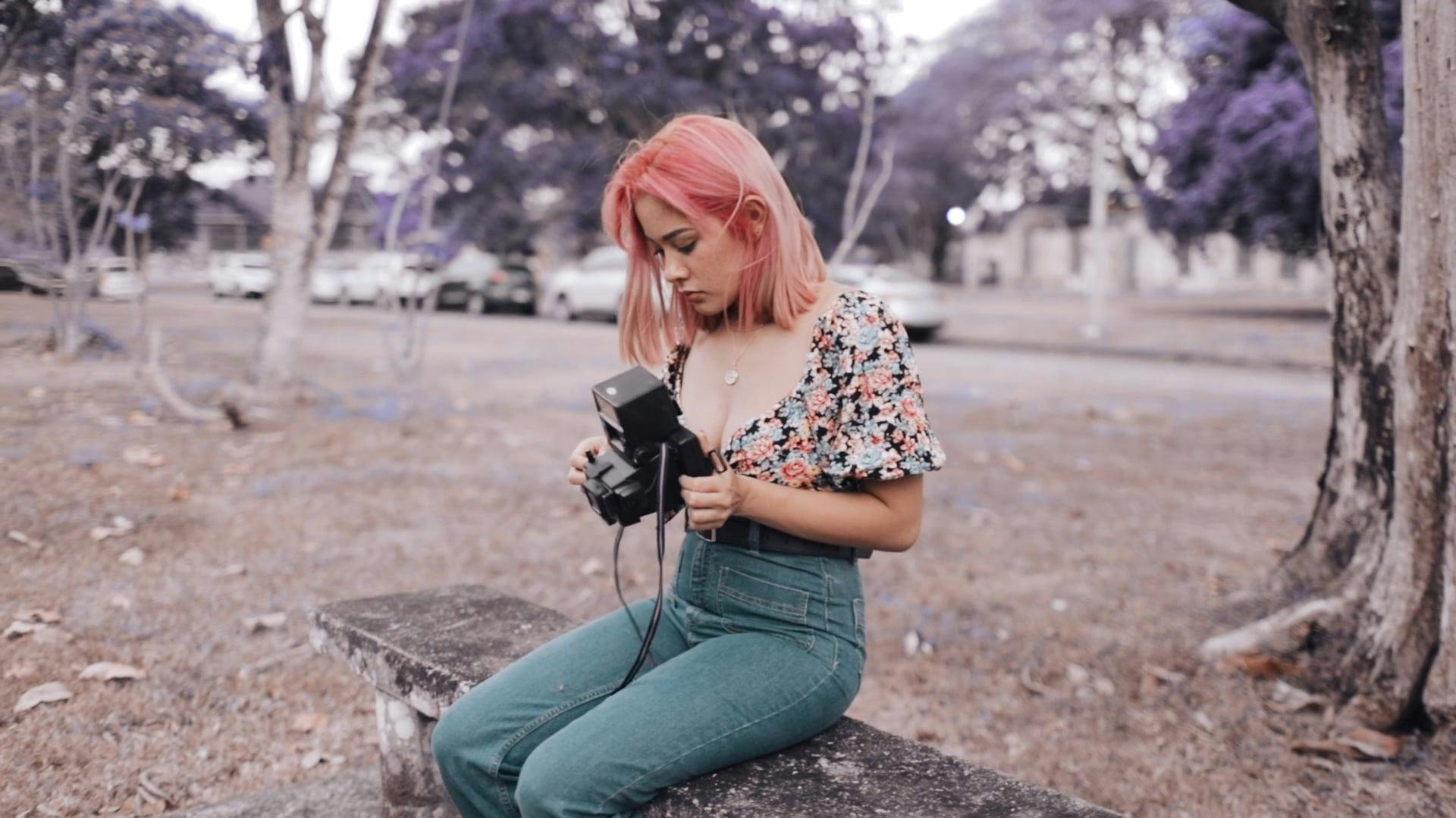 Woman Holding A Camera · Free Stock Video