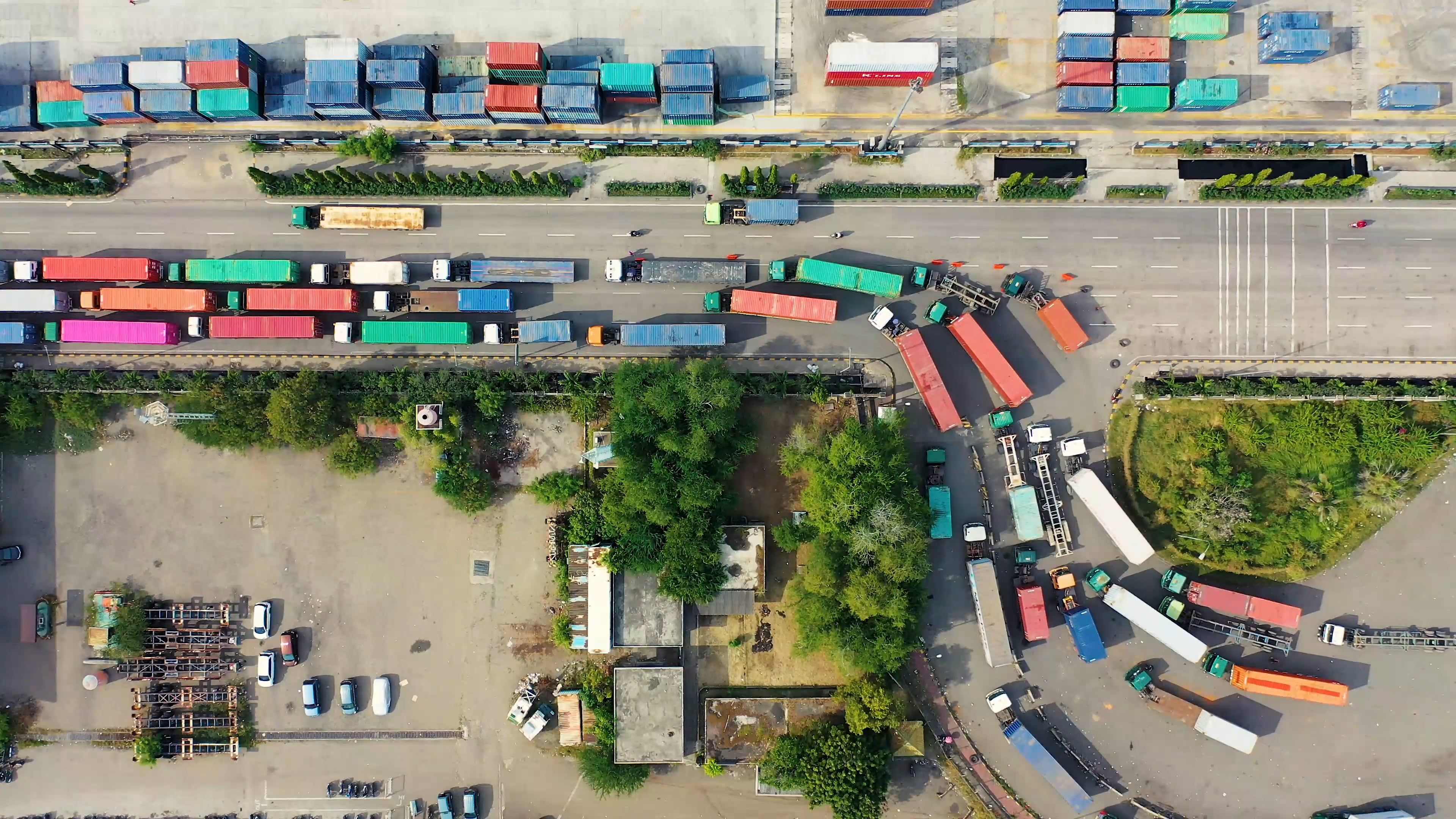 Drone Video of Transport Trucks at Logistic Yard Free Stock Video ...