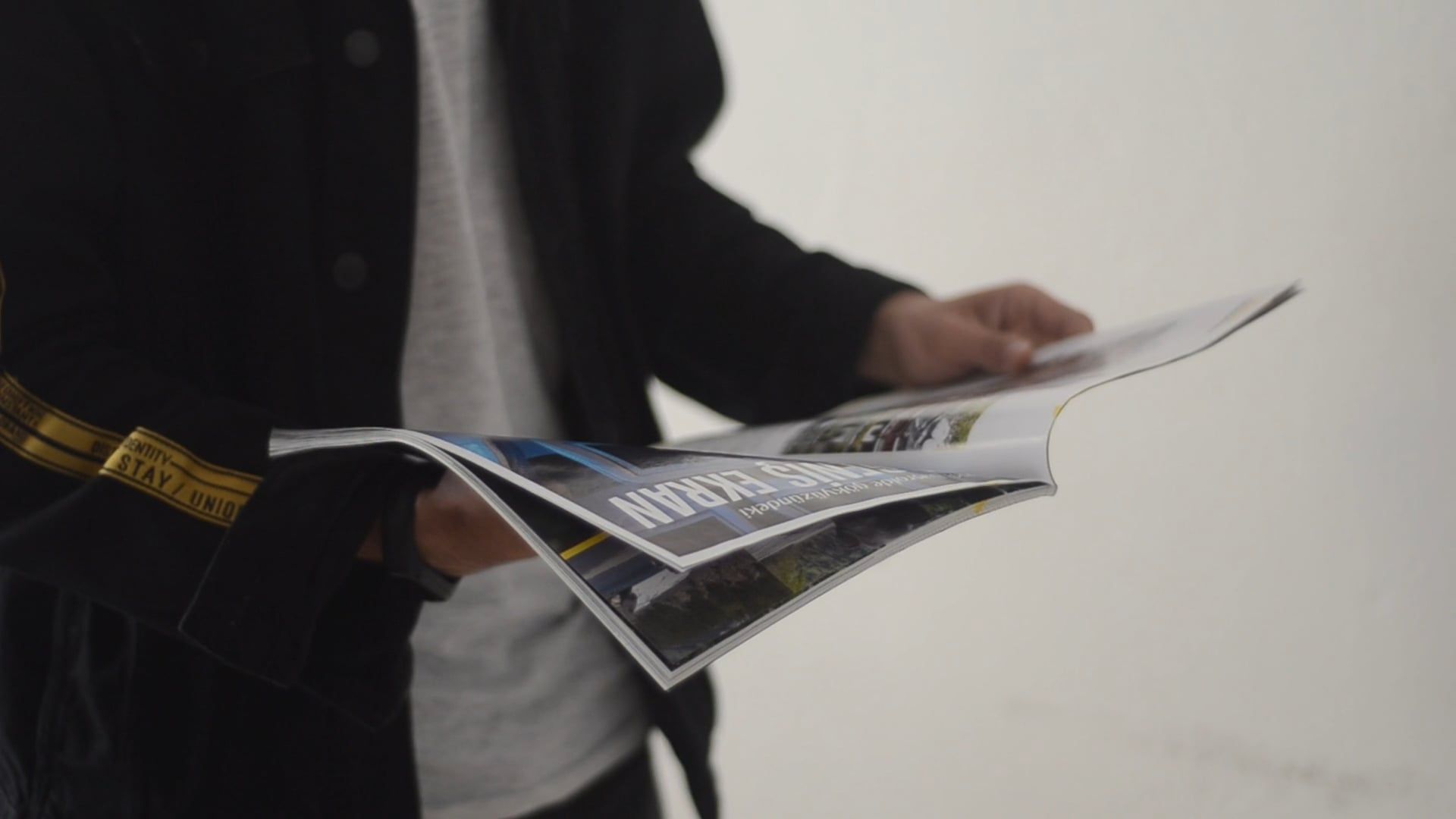 Glancing Through A Magazine · Free Stock Video