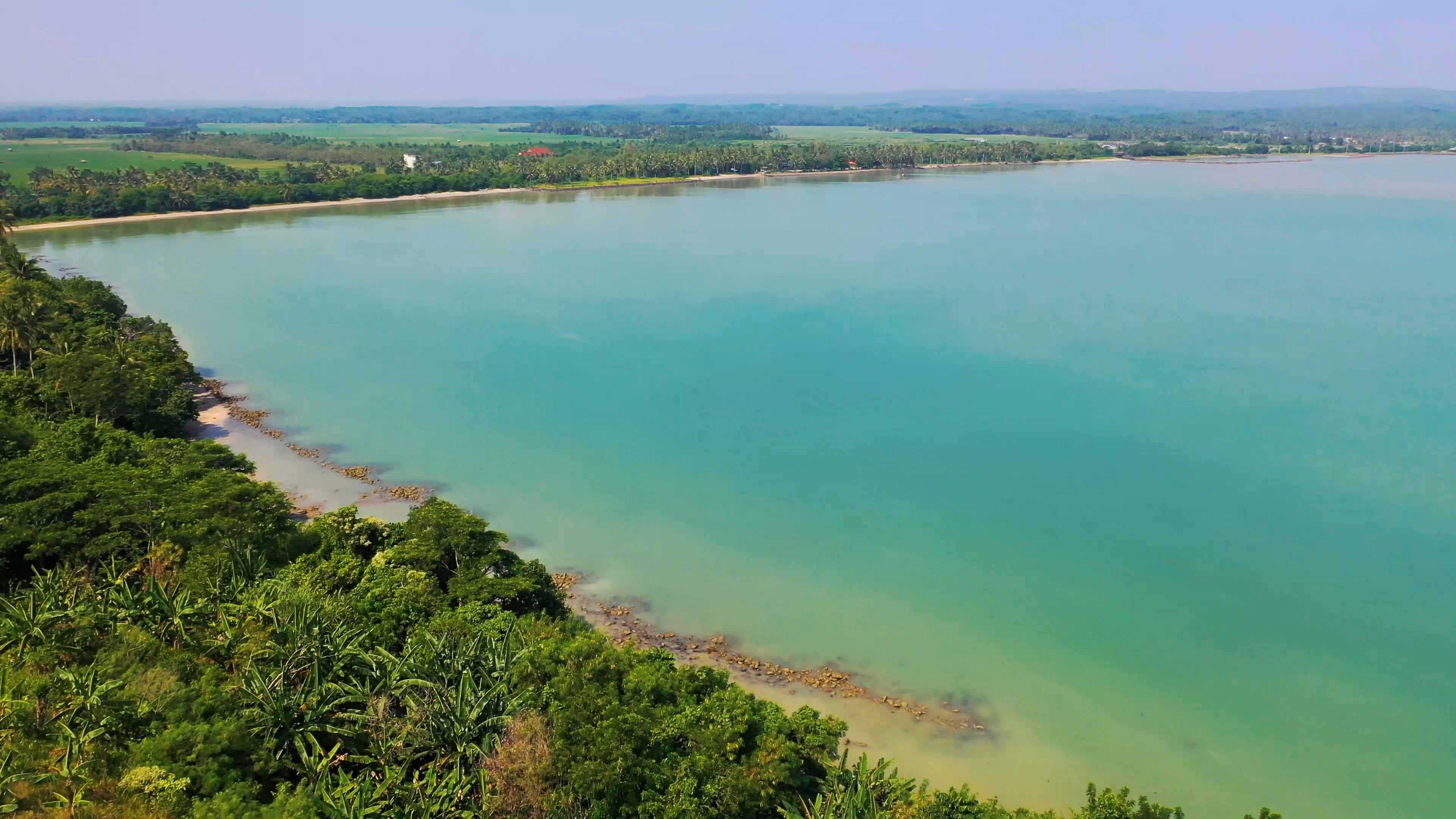Aerial View Of A Vast Agricultural Land Near Body Of Water · Free Stock ...