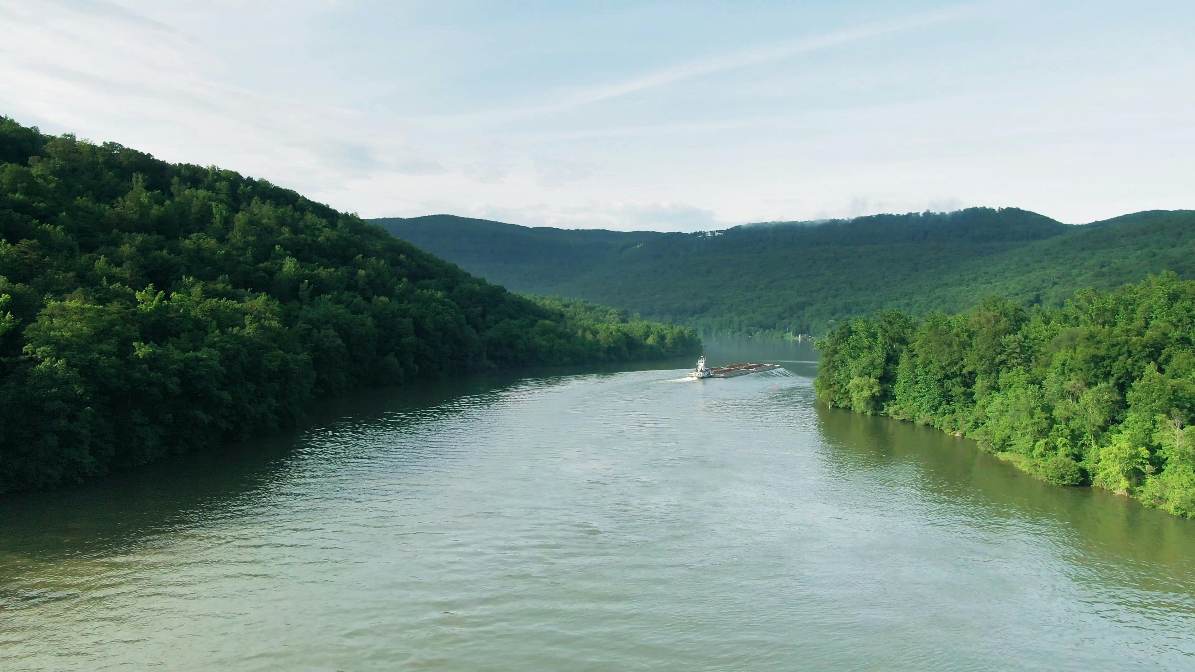 Drone Footage Of A River Surrounded By Lush Land · Free Stock Video