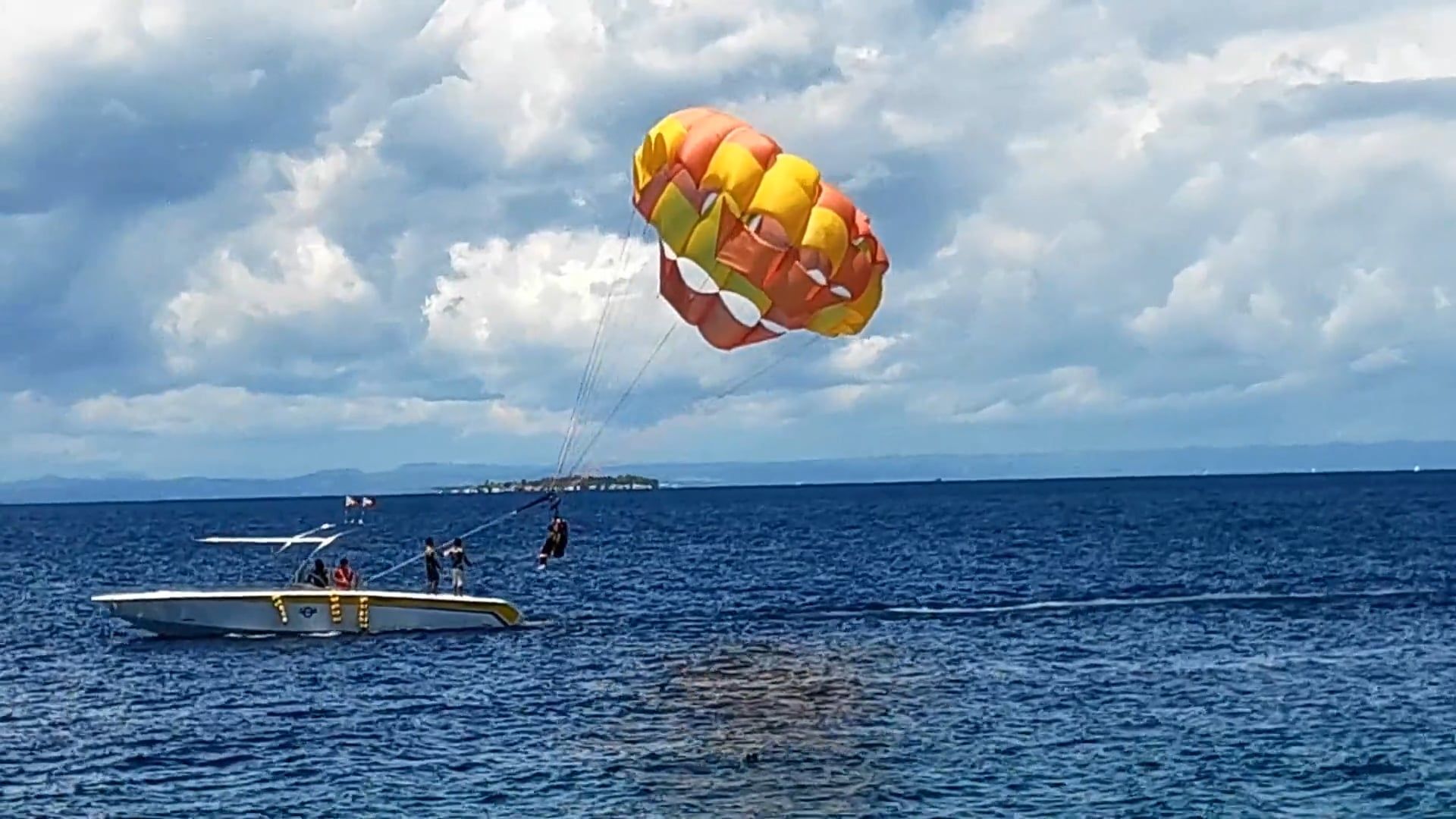 Parasailing Landing On The Boat · Free Stock Video