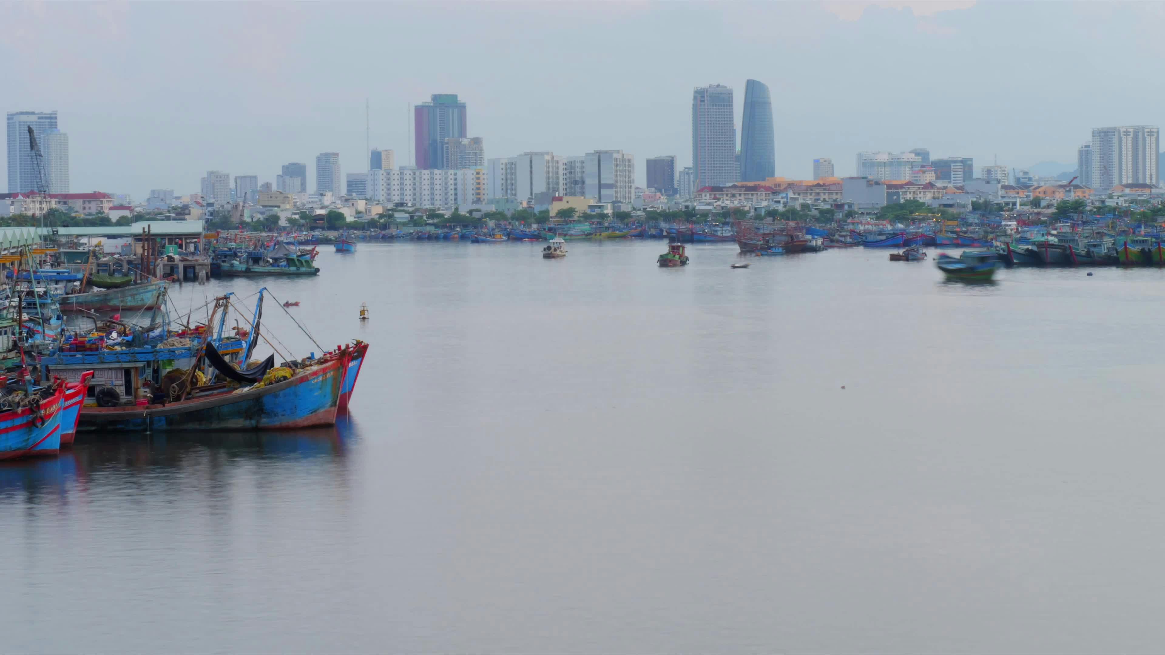 A city skyline with boats in the water Free Stock Video Footage ...