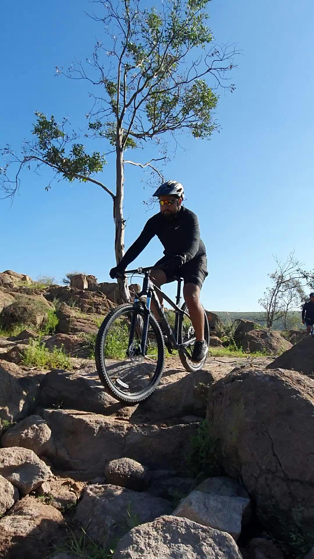 A Biker Riding A Mountain Bike On An Off Road Trail Free Stock Video ...