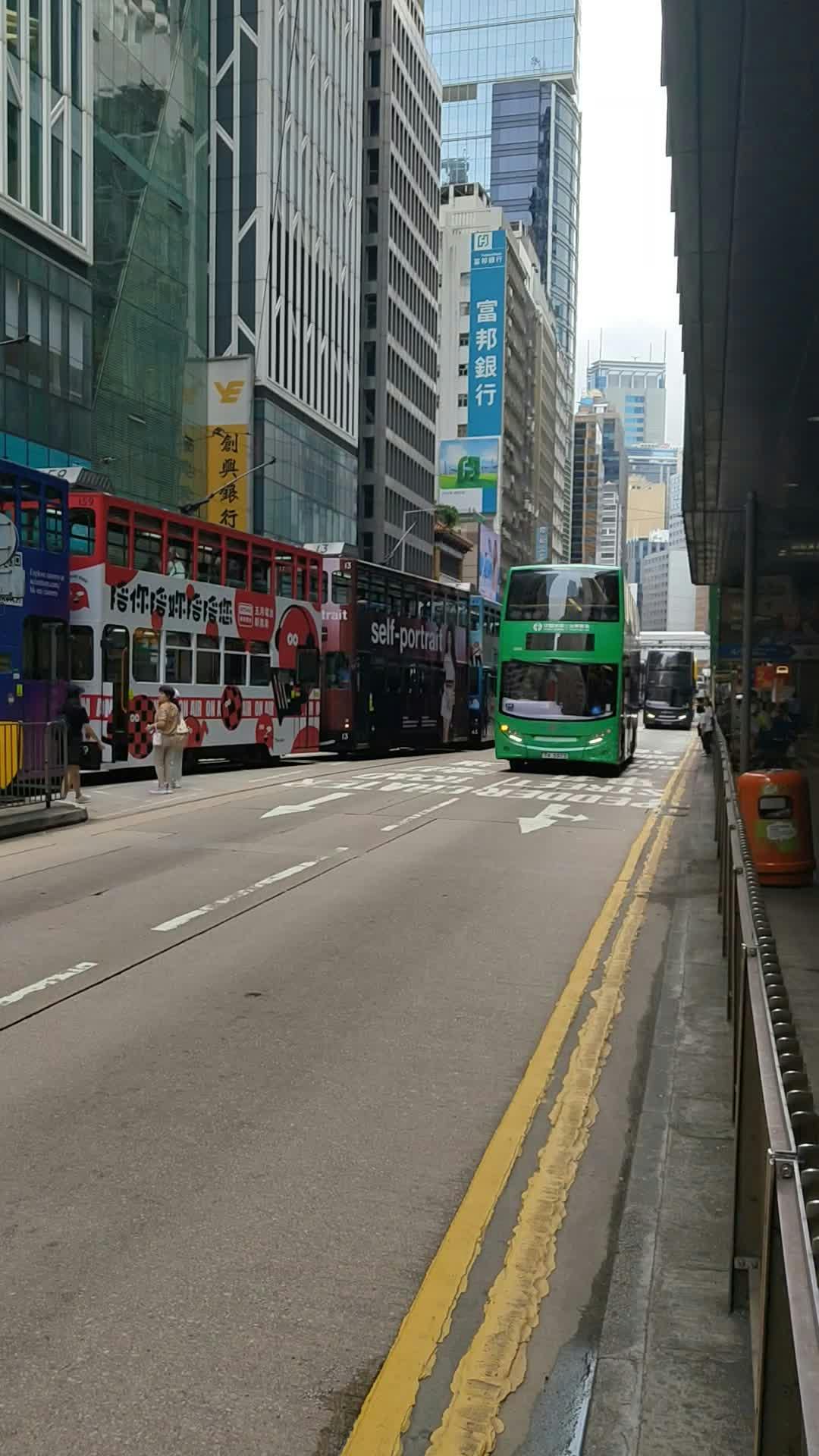 A street with a bus and a building on it Free Stock Video Footage ...