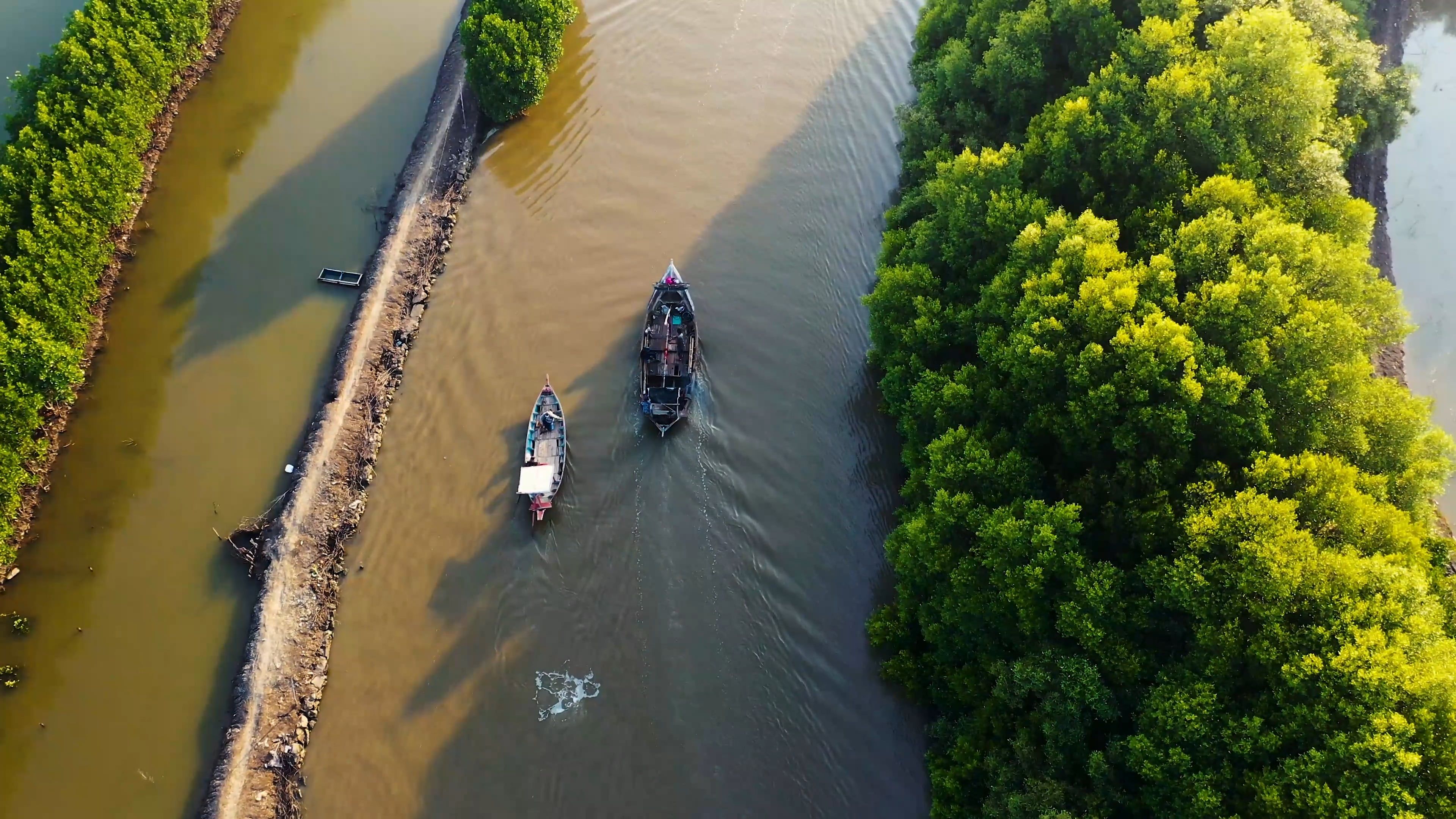 Aerial Footage Of Two Boats Channeling Through A Waterway · Free Stock ...