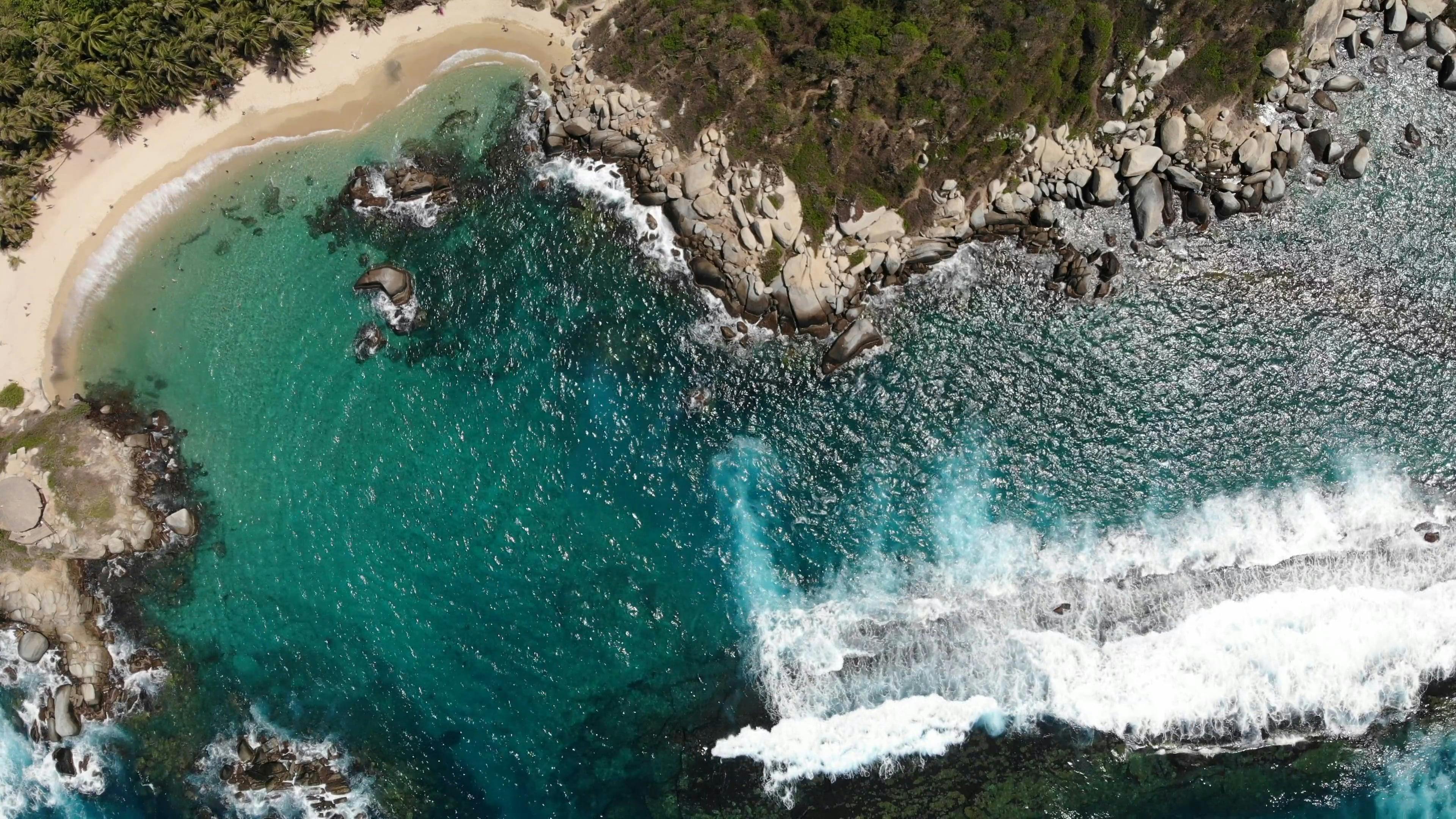 A View From Above Of A Beautiful Shoreline With Waves Breaking · Free ...