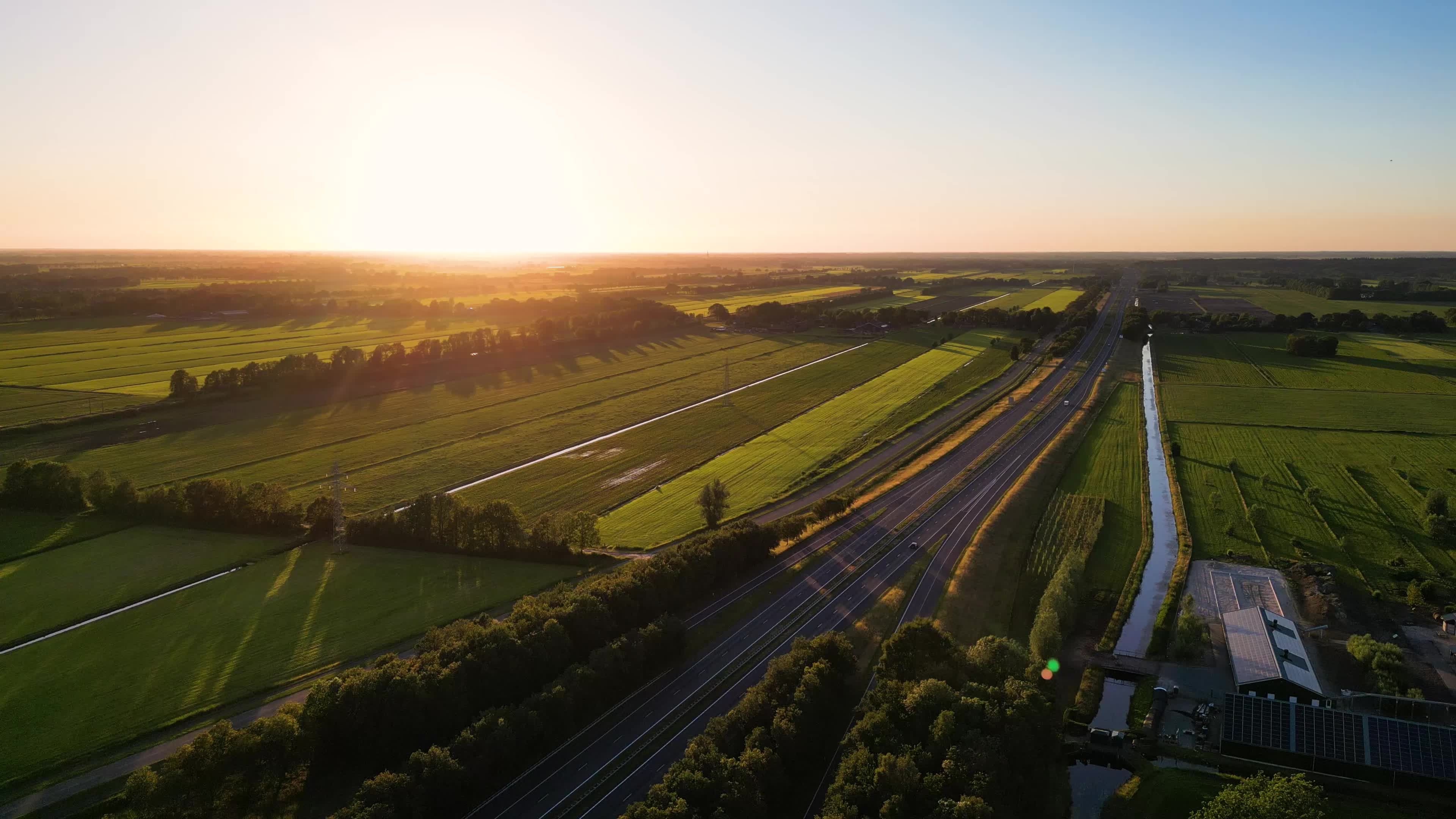 Aerial view of a highway and a field Free Stock Video Footage, Royalty ...