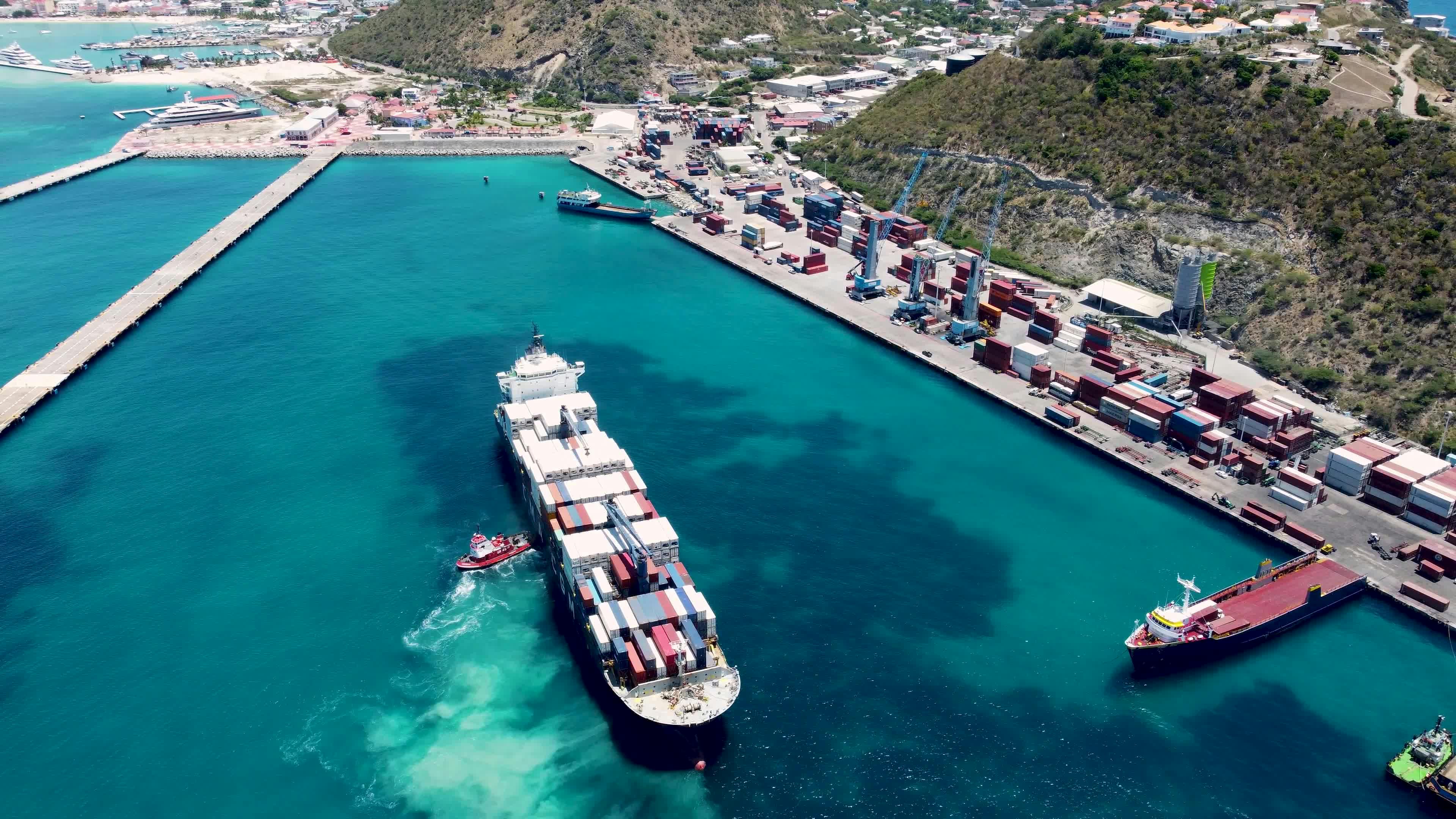 Arrival of containership in Caribbean harbor. Free Stock Video Footage ...
