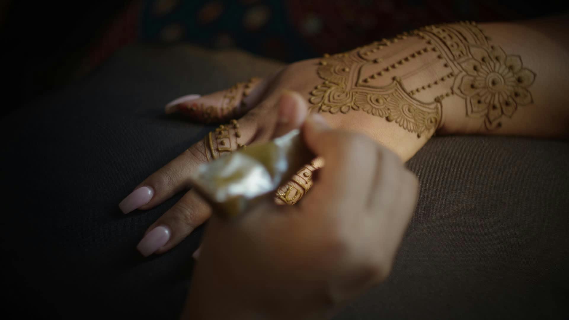 A woman's hands are decorated with henna Free Stock Video Footage ...