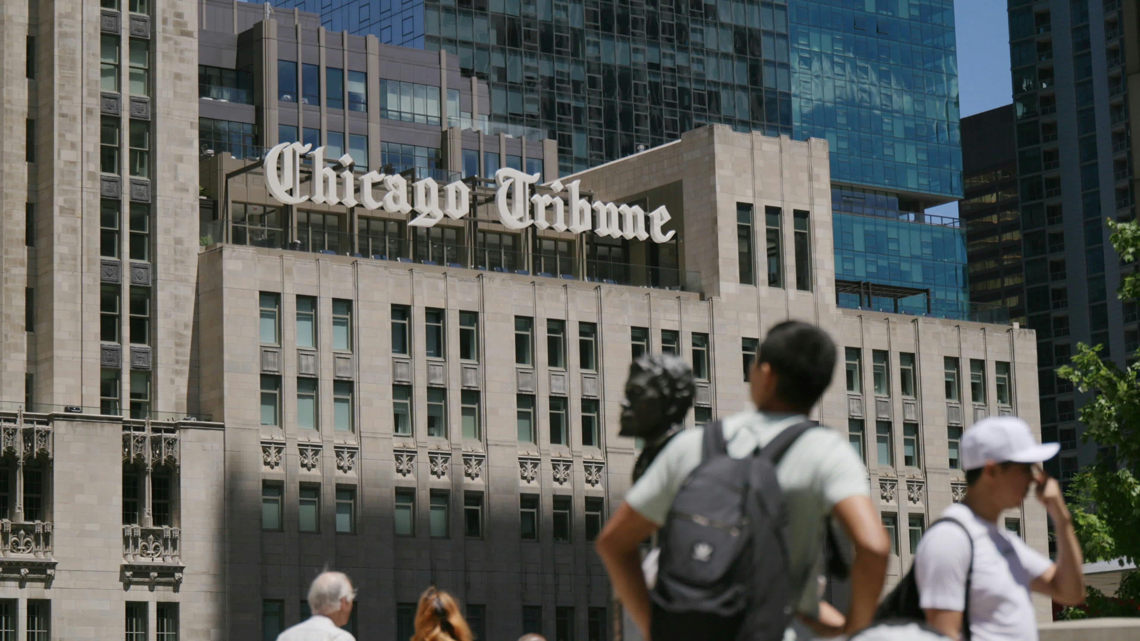 People walking in front of the chicago times building Free Stock Video ...