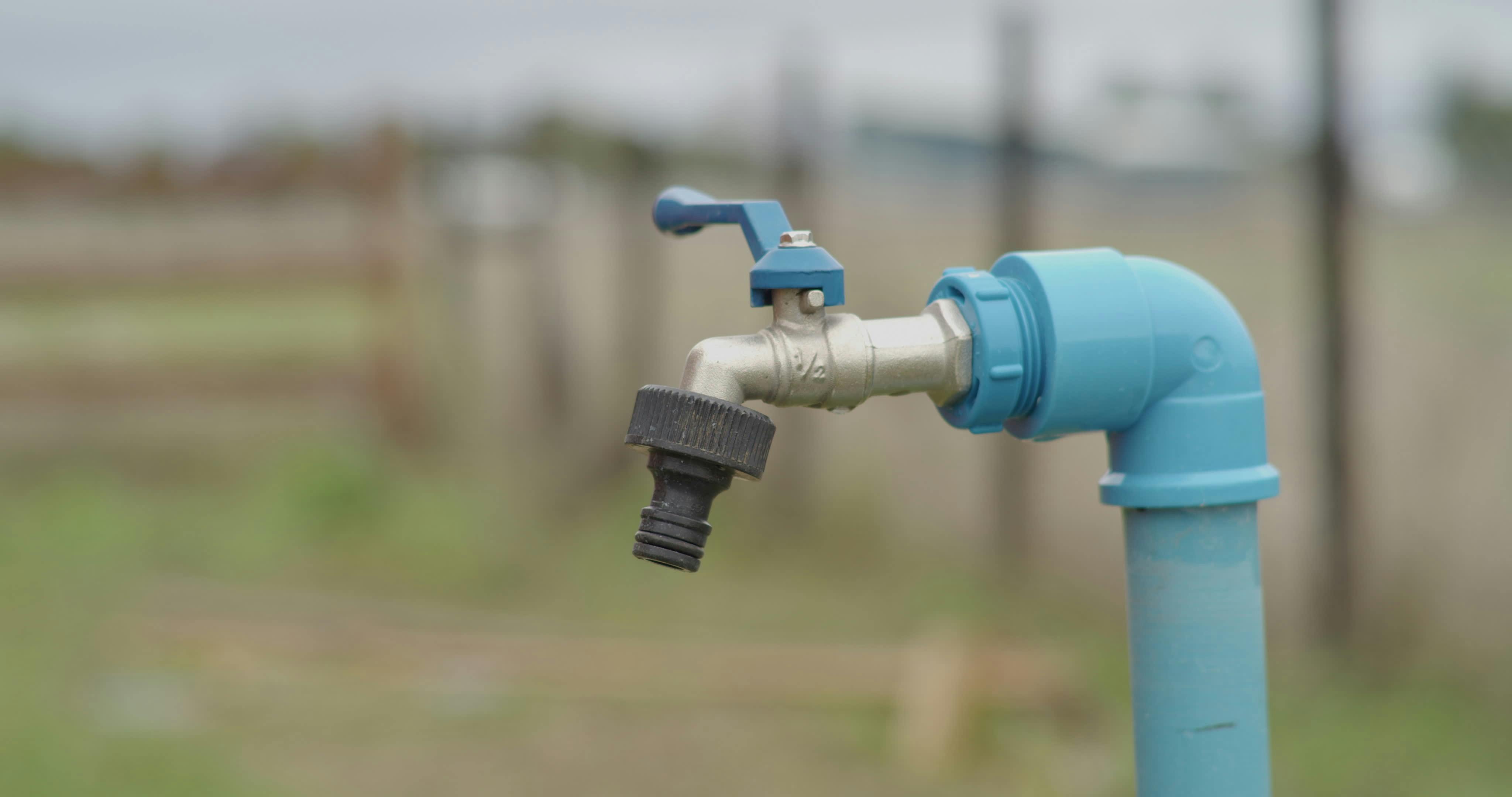 A person is holding a blue water pipe Free Stock Video Footage, Royalty ...