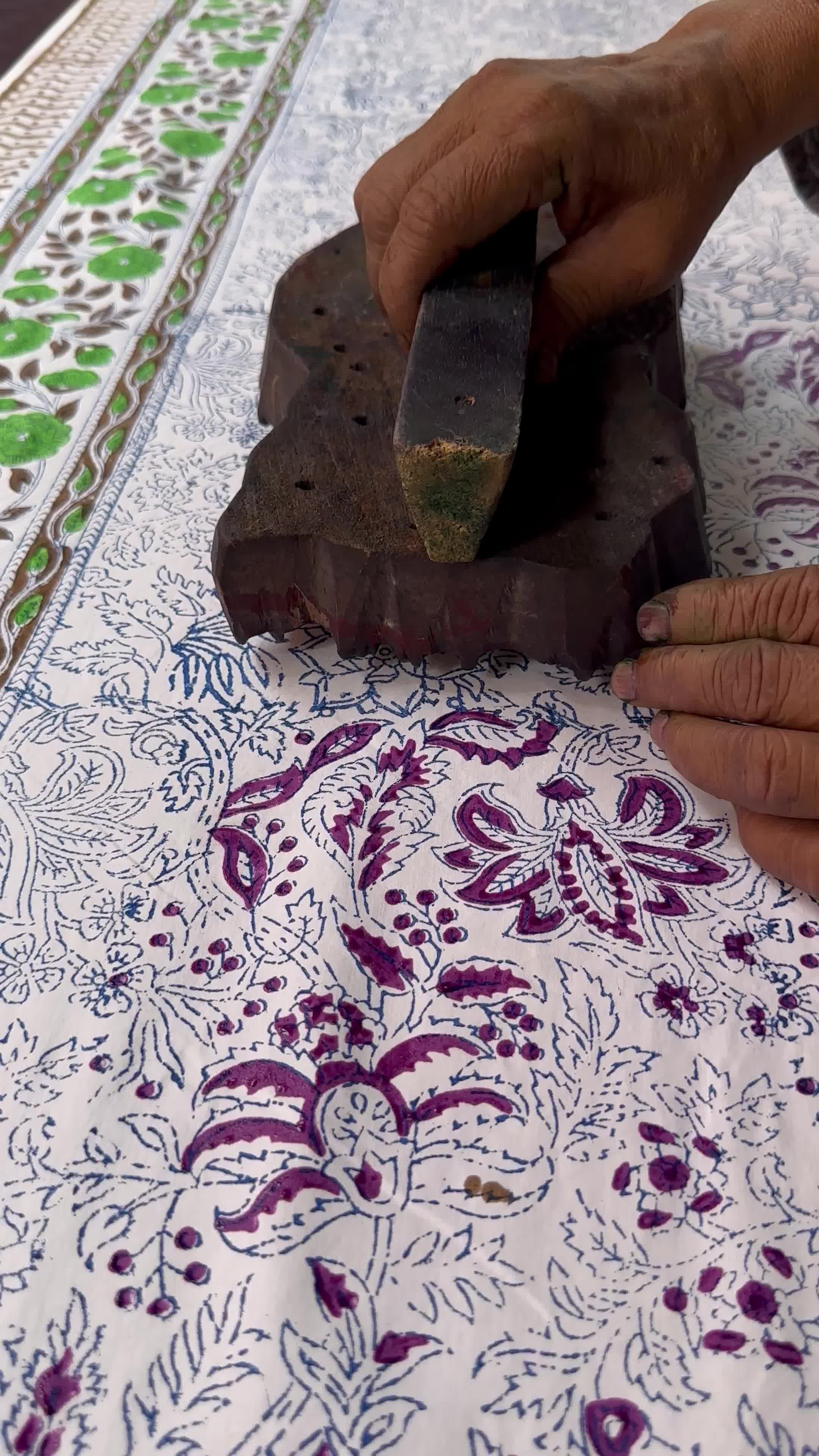 A person is using a tool to make a pattern on a table Free Stock Video ...