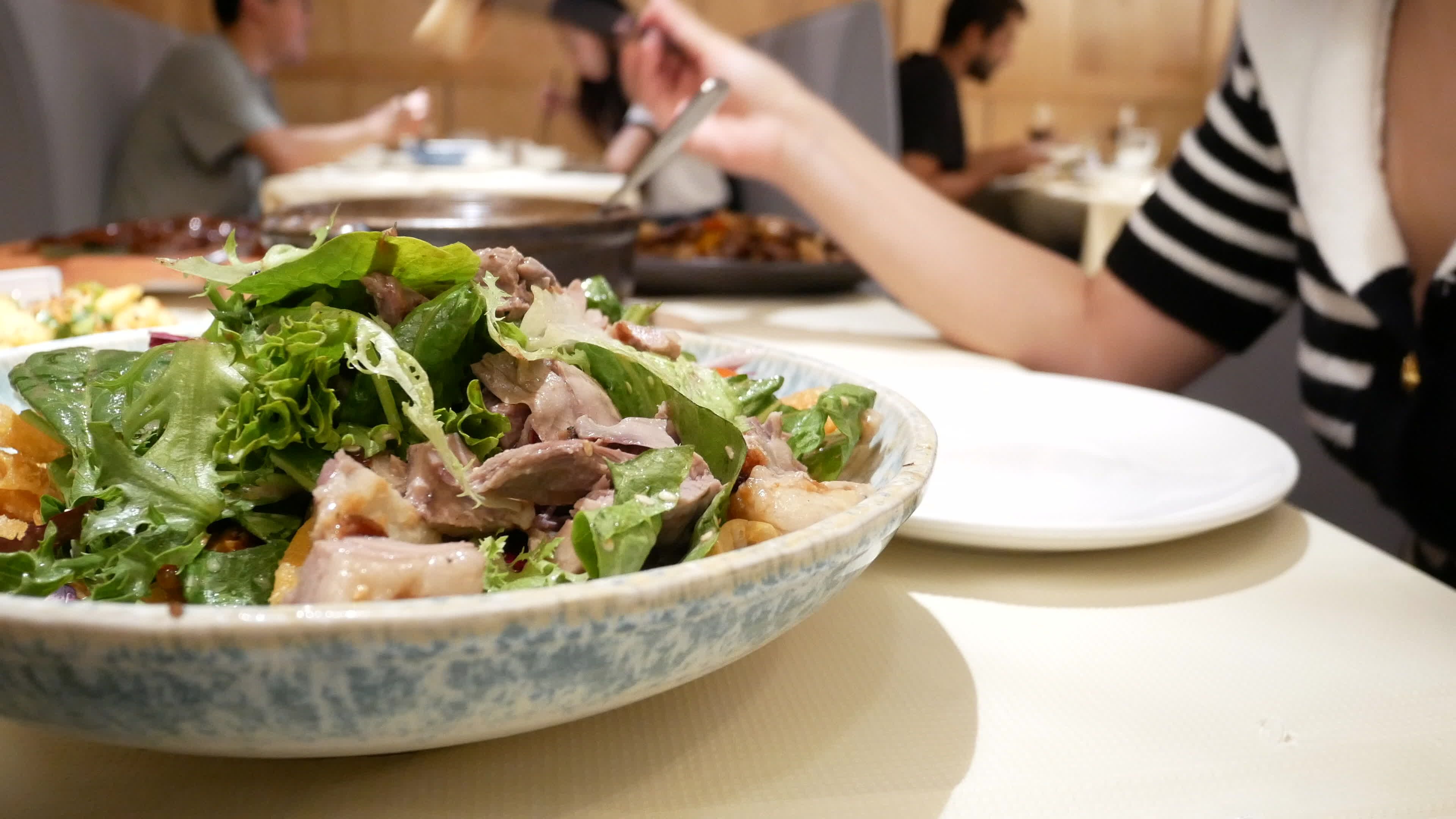 A woman is eating a bowl of food Free Stock Video Footage, Royalty-Free ...