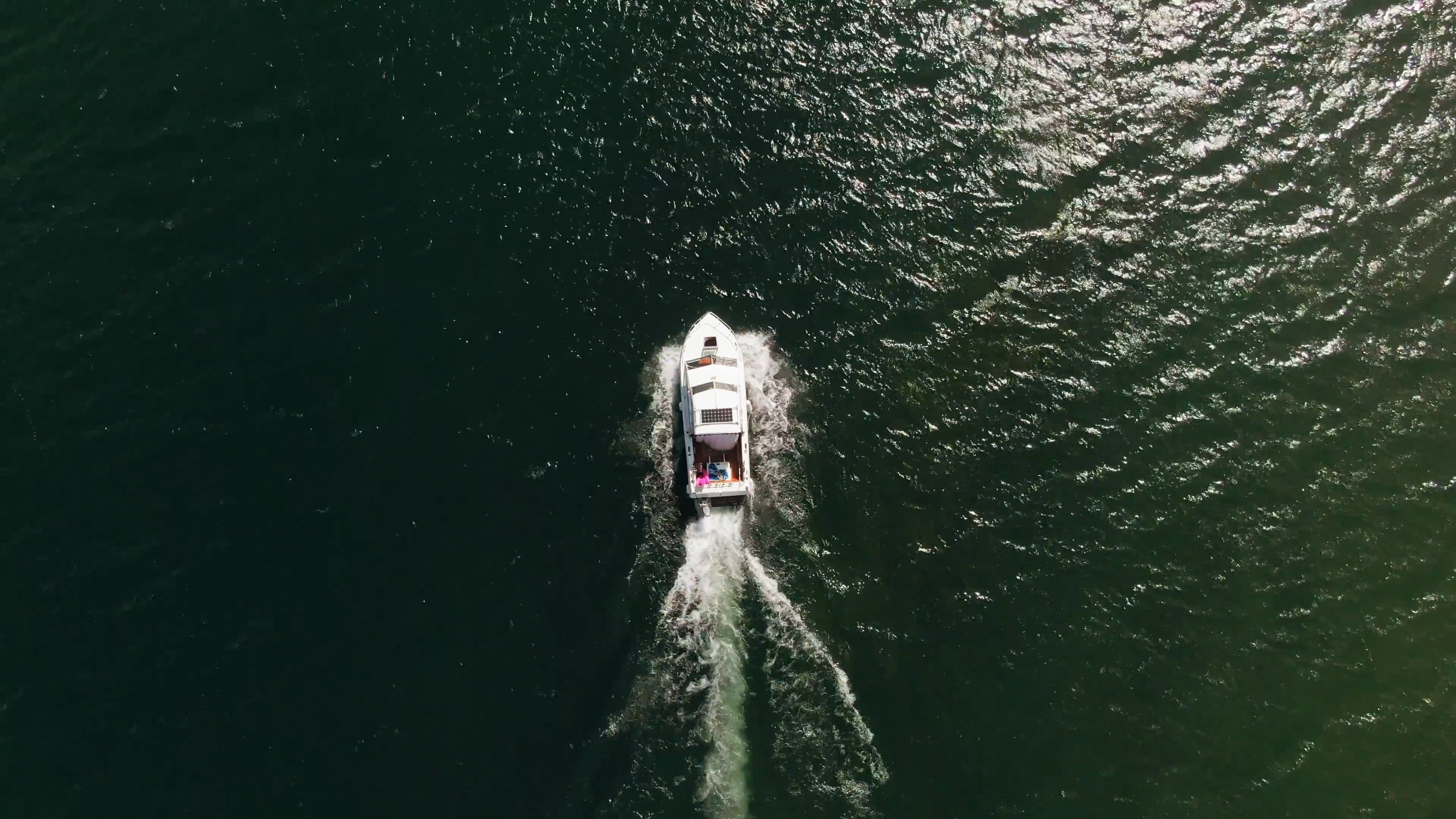 Tracking A Speeding Boat In The Water · Free Stock Video