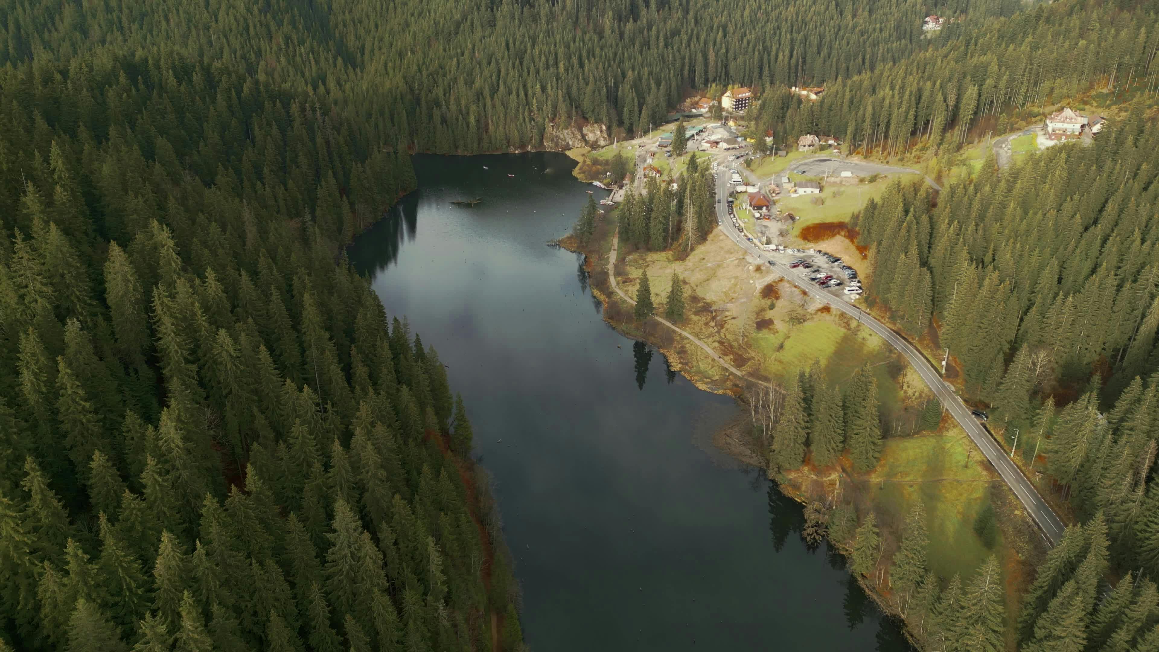 Red lake, a scenic destination in Romania, surrounded by dense pine ...