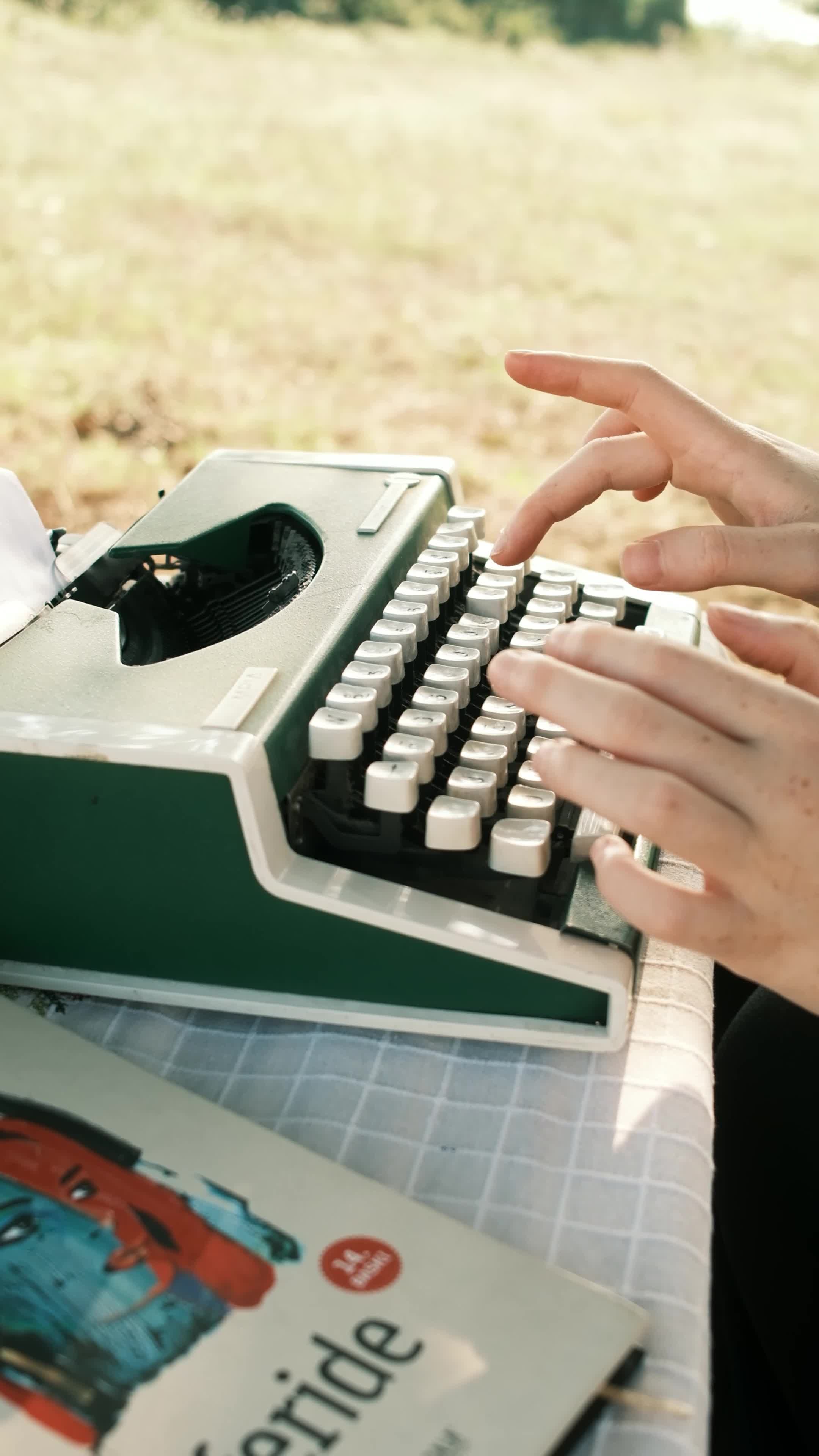 Woman Typing On Typewriter