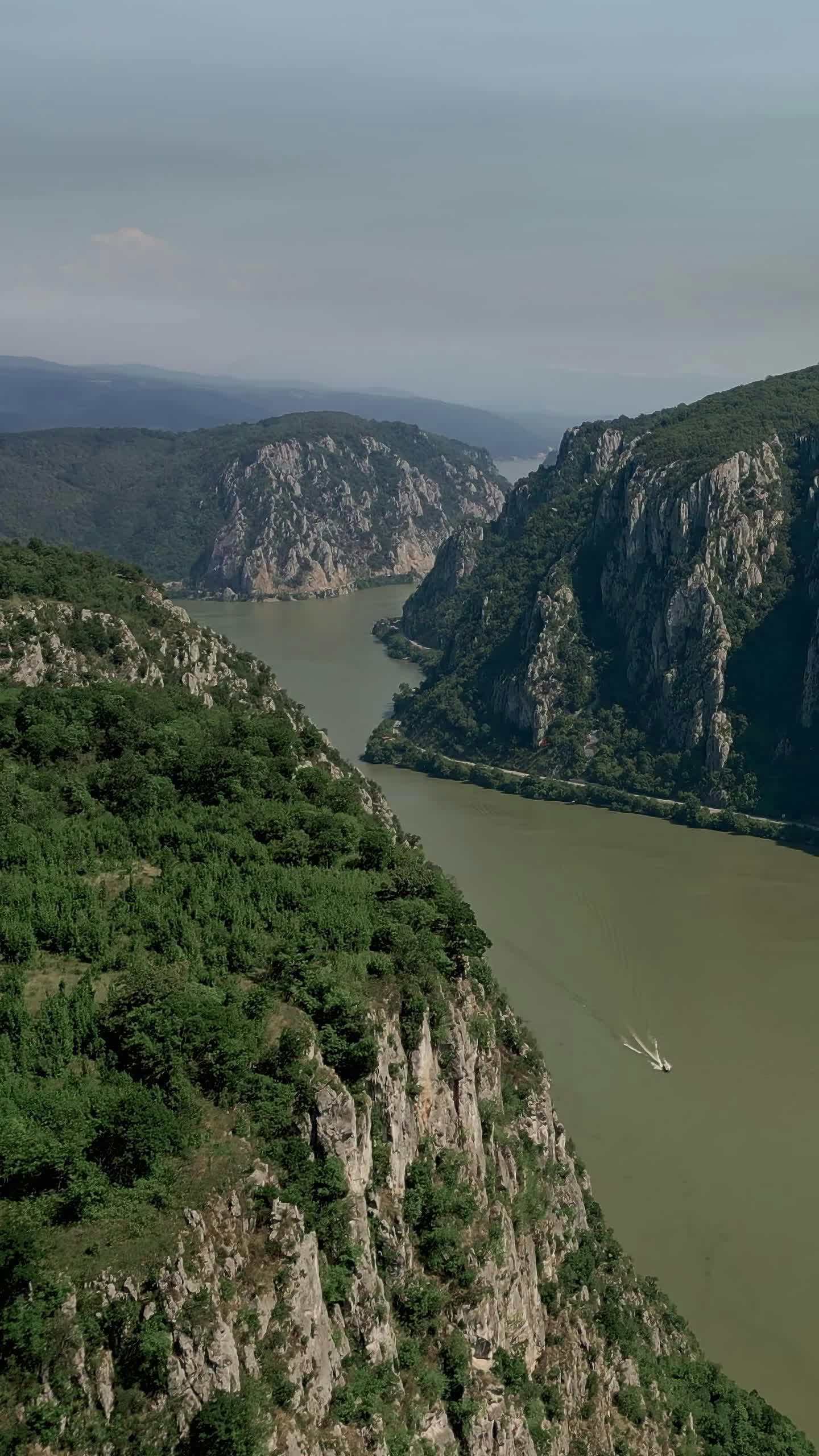 The image captures a stunning view of the Danube River cutting through ...