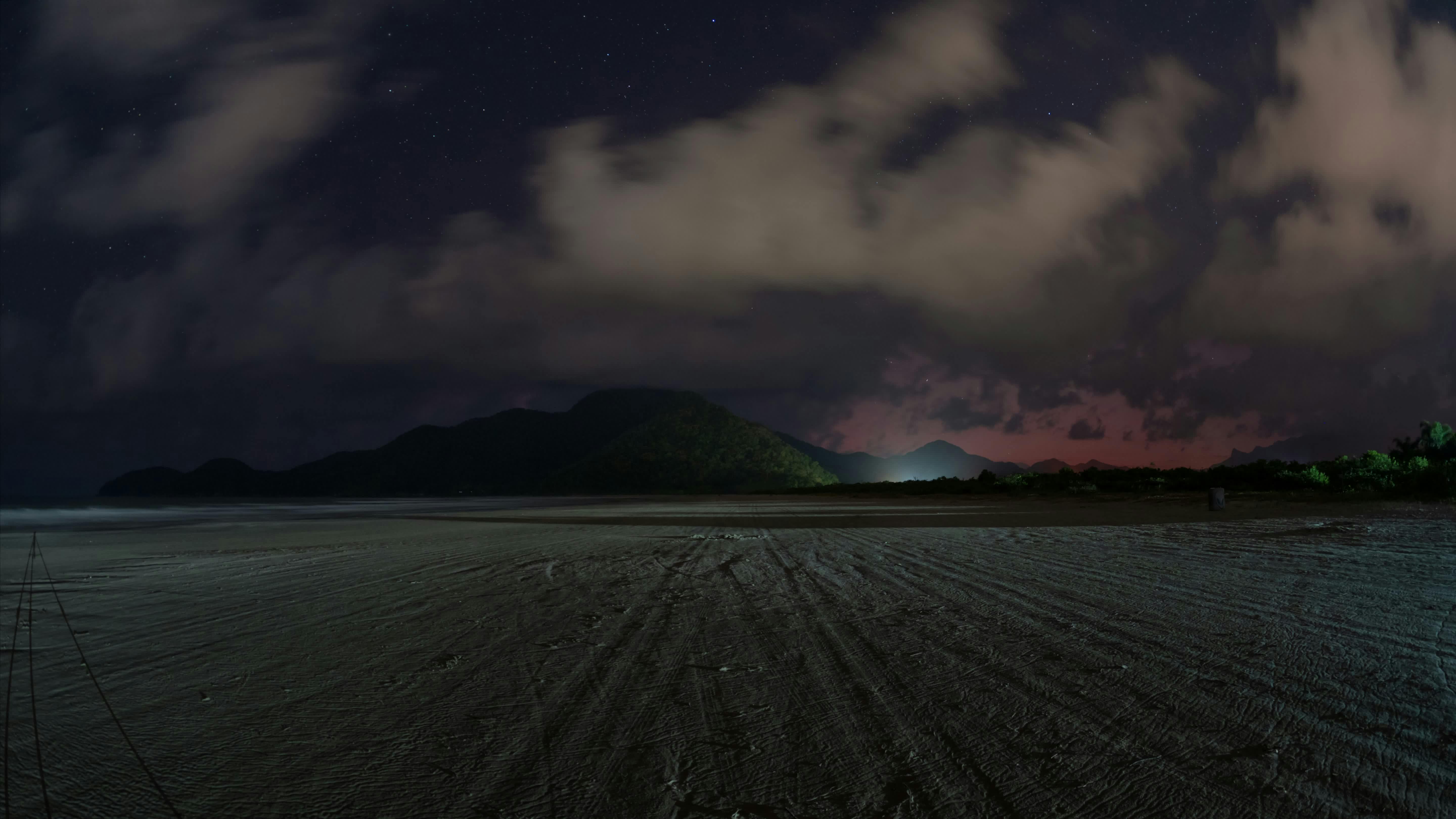Time lapse of clouds moving during nightfall with stars in the sky Free ...