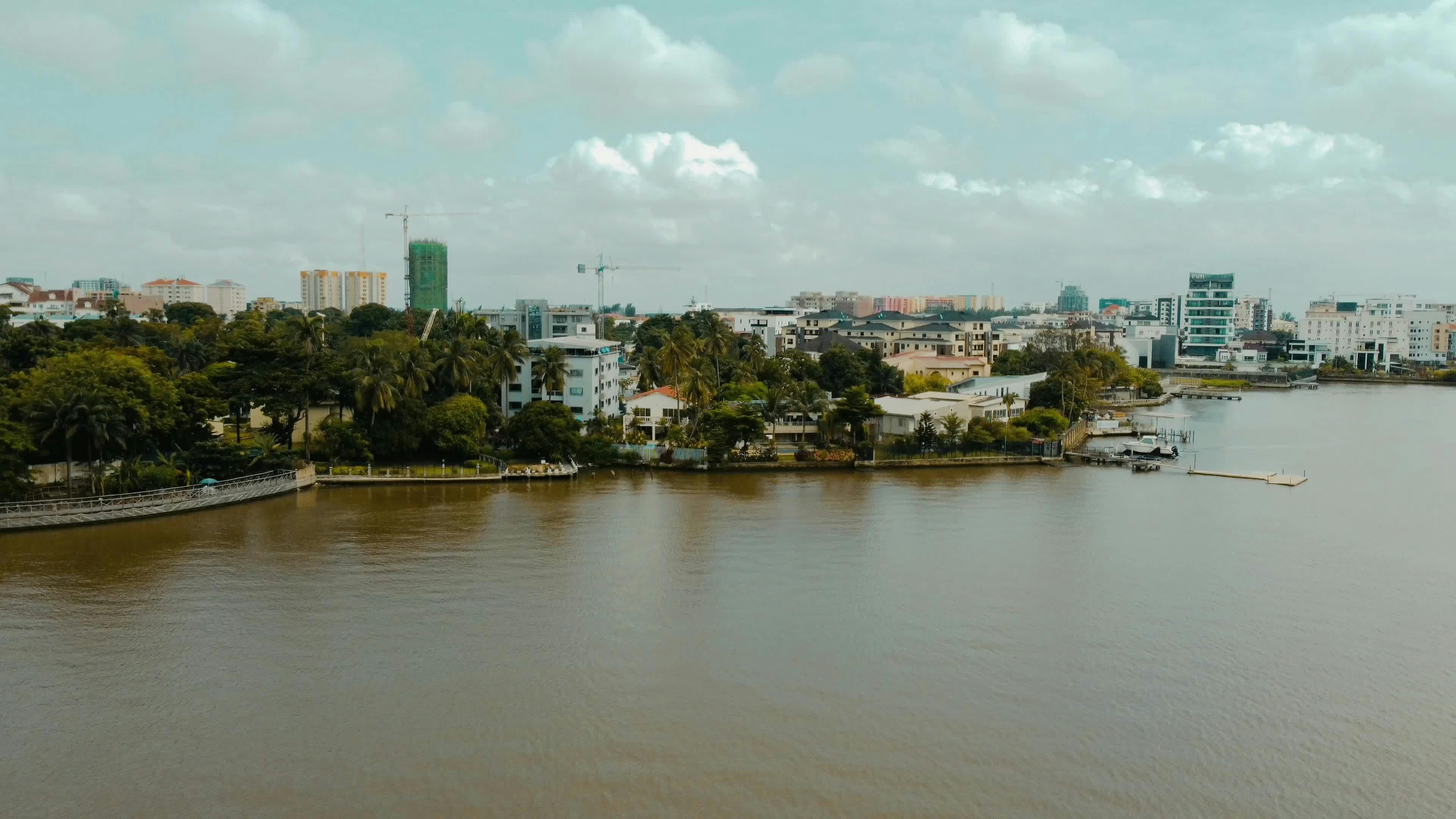 Riverside Urban Scene with Boats and Buildings Free Stock Video Footage ...