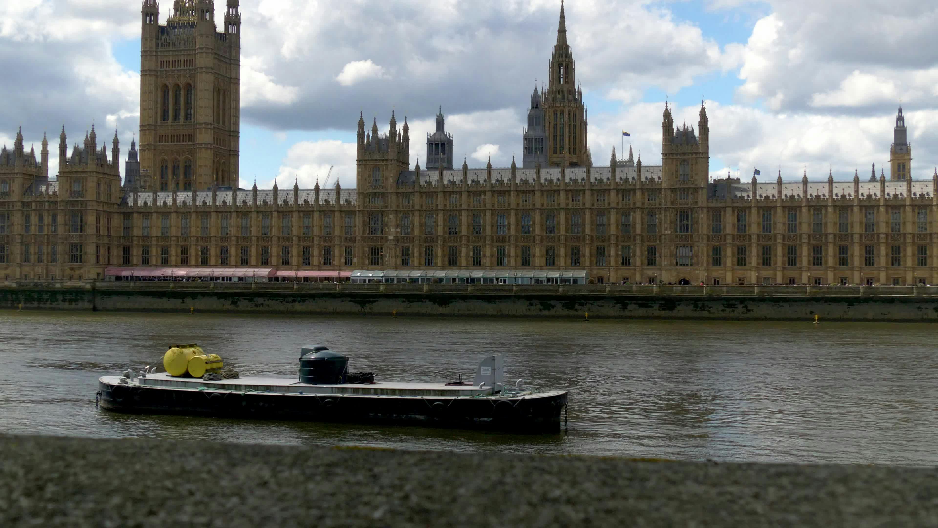 A boat is in front of the big ben clock tower Free Stock Video Footage ...