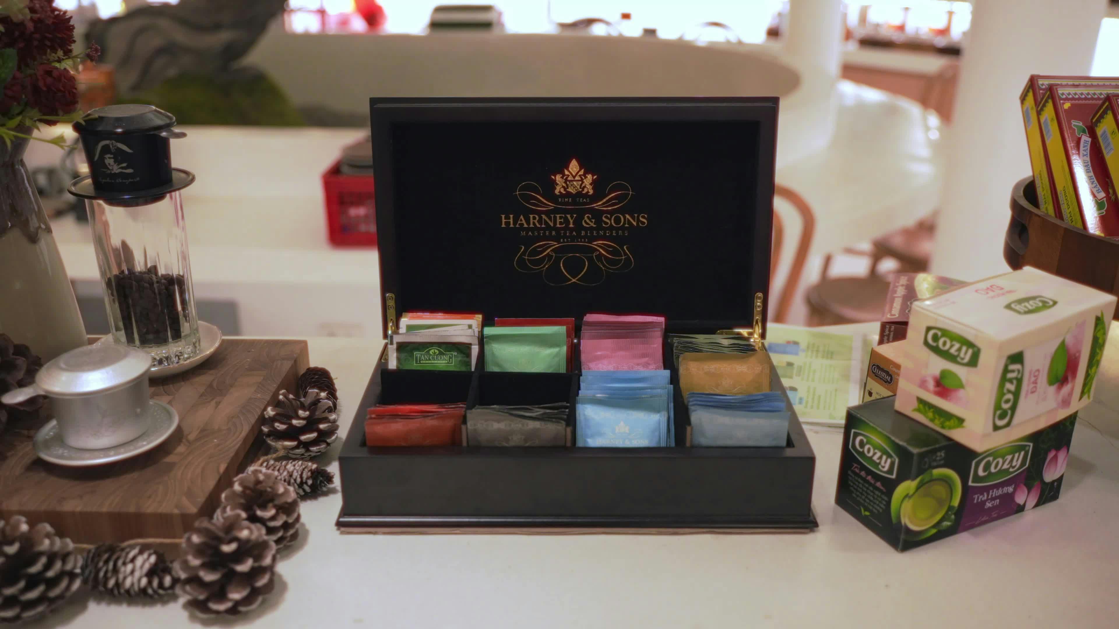 A table with a box of tea and other items Free Stock Video Footage ...