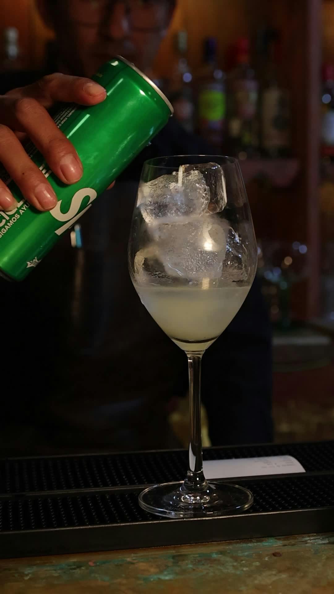 A bartender pouring a drink into a glass Free Stock Video Footage ...