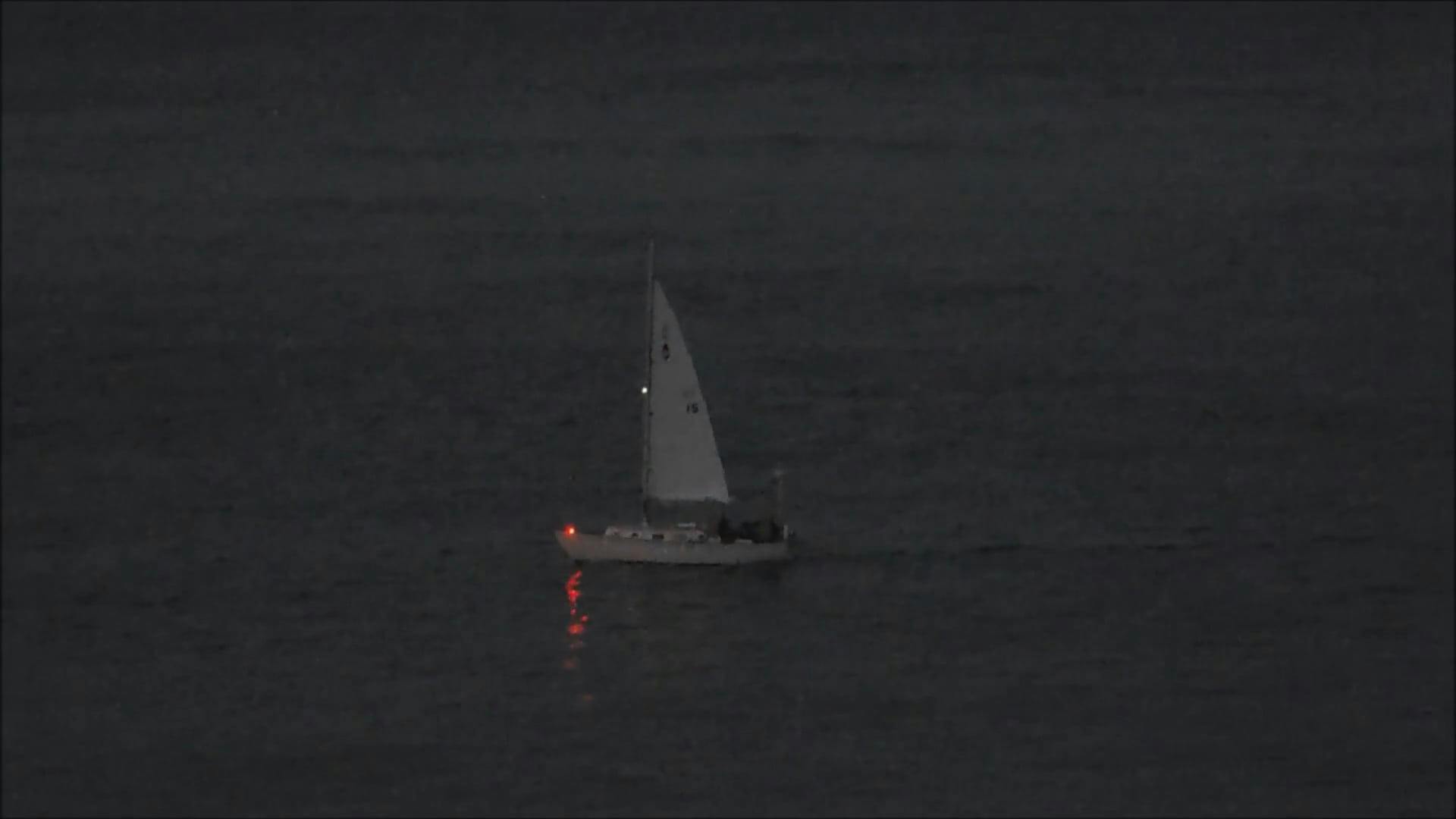 A Sailboat Sailing At Night · Free Stock Video