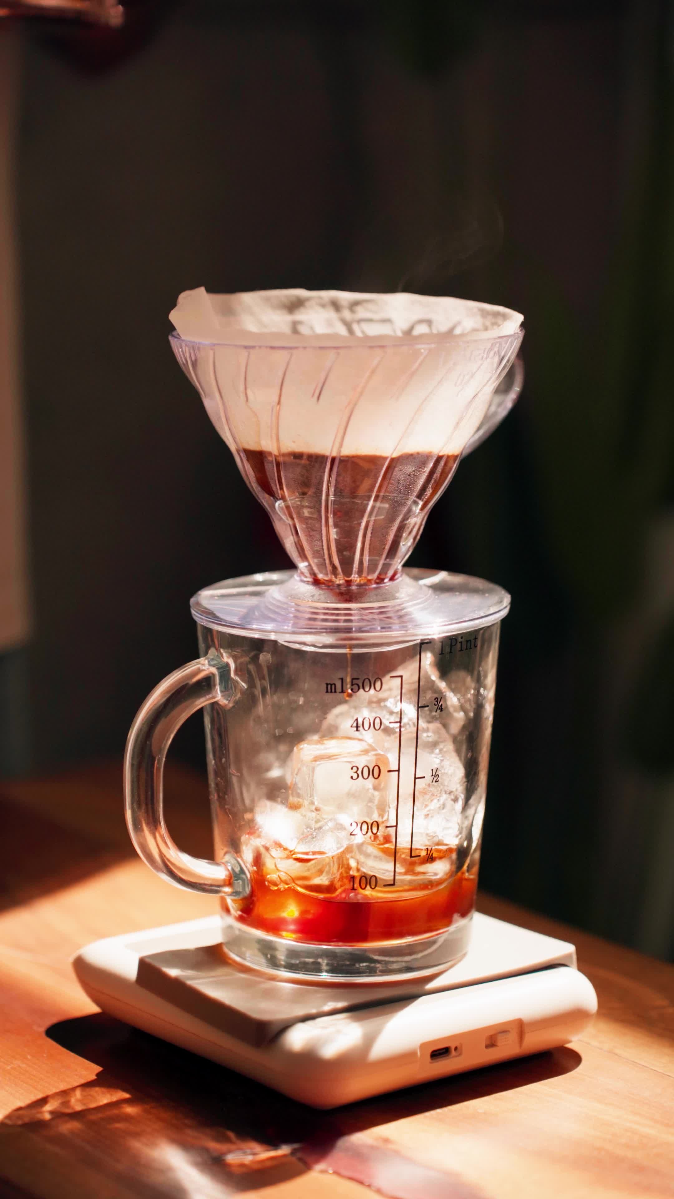 A coffee maker is being used to make coffee Free Stock Video Footage ...