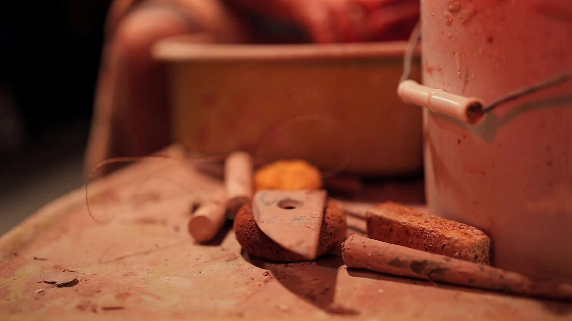 A person is making a pottery with a bucket Free Stock Video Footage ...