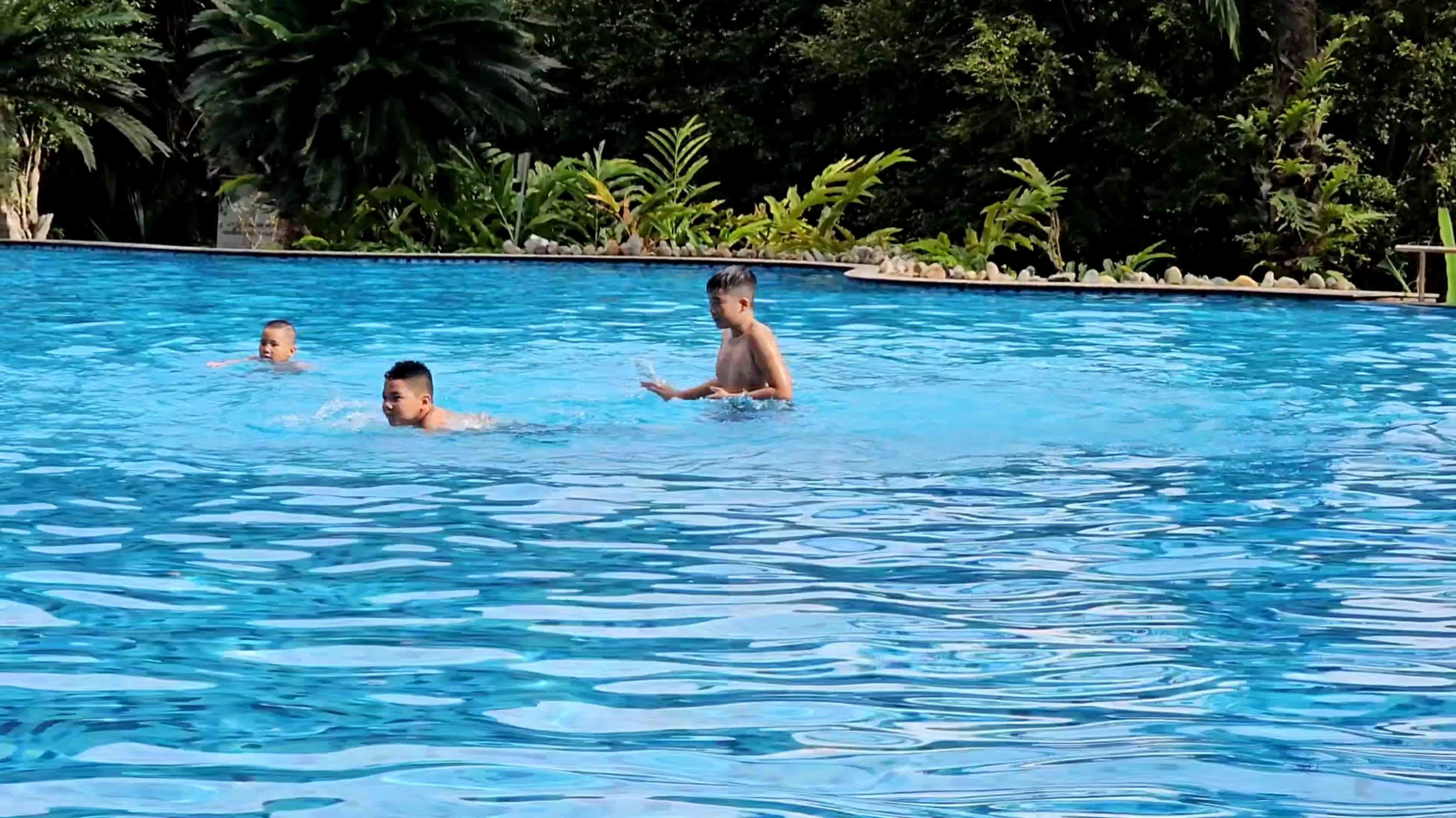 Children playing together in the swimming pool Free Stock Video Footage ...