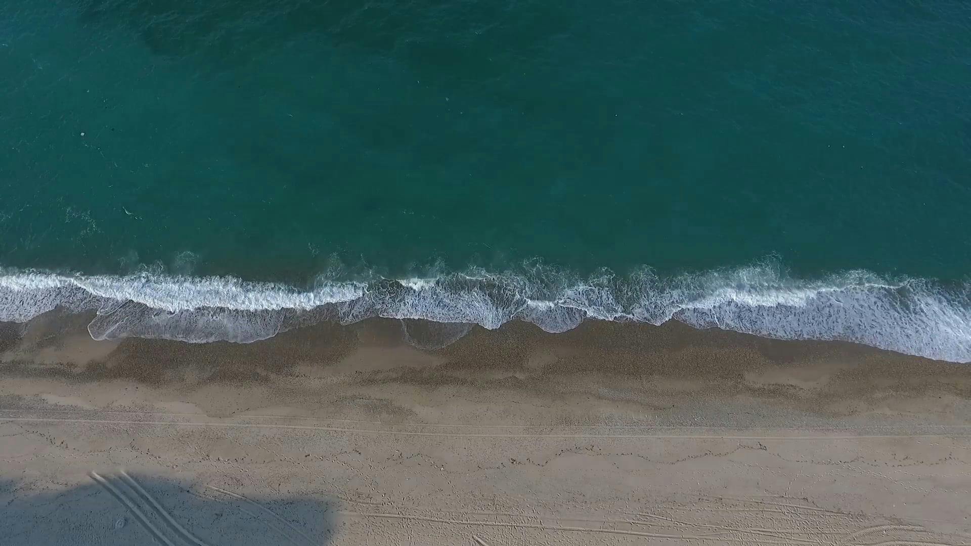 Drone Footage Of A Beach Coastline · Free Stock Video