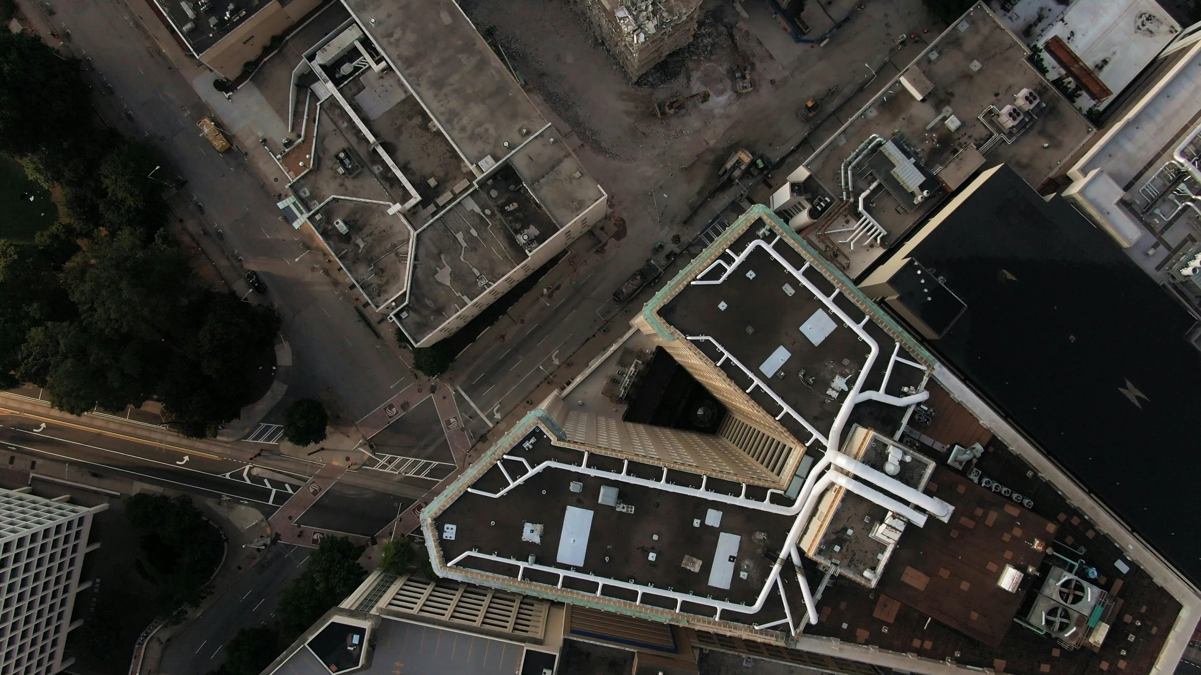 View From Above Of Building Rooftops In A City · Free Stock Video