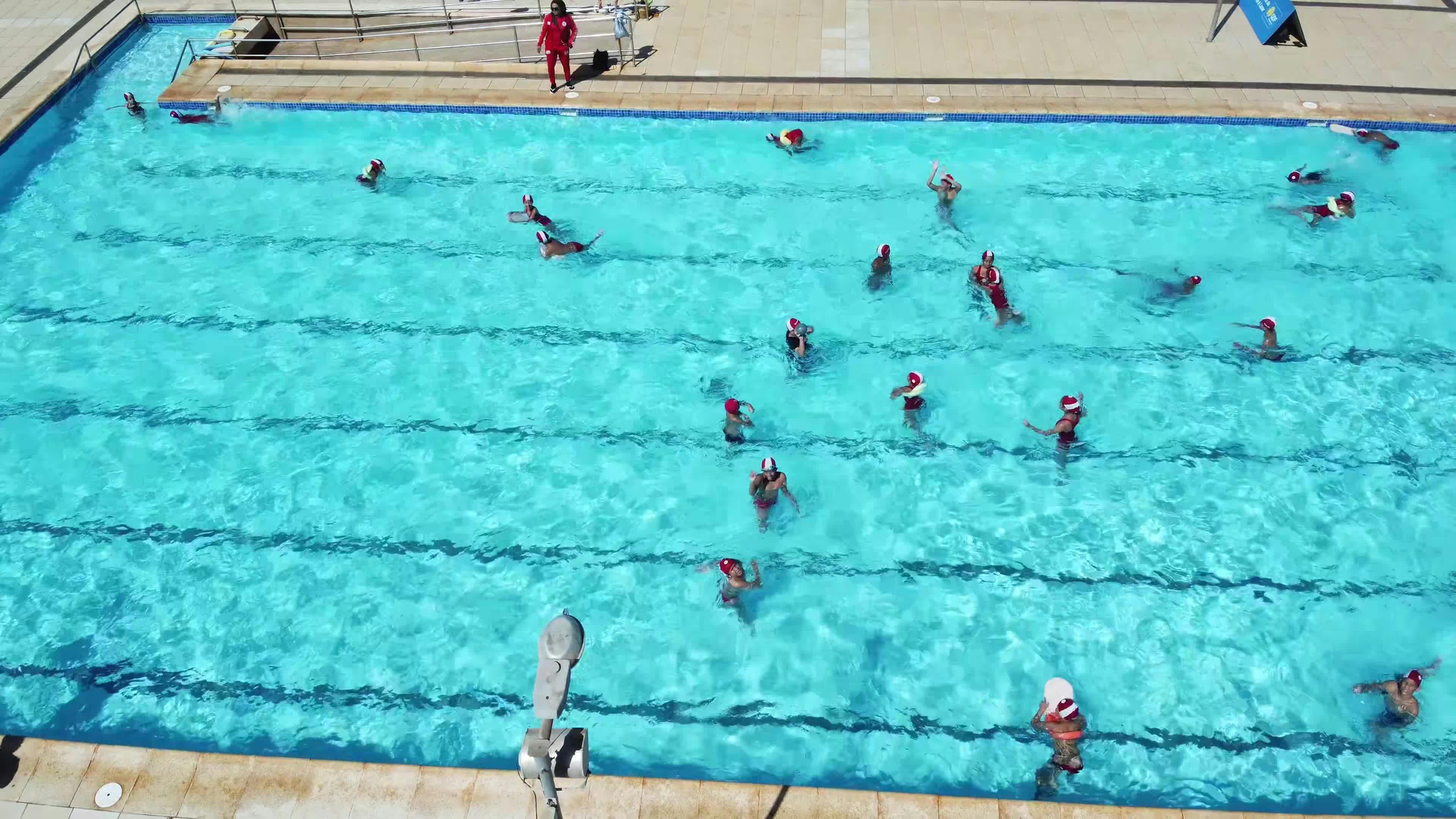 A large swimming pool with people in it Free Stock Video Footage ...