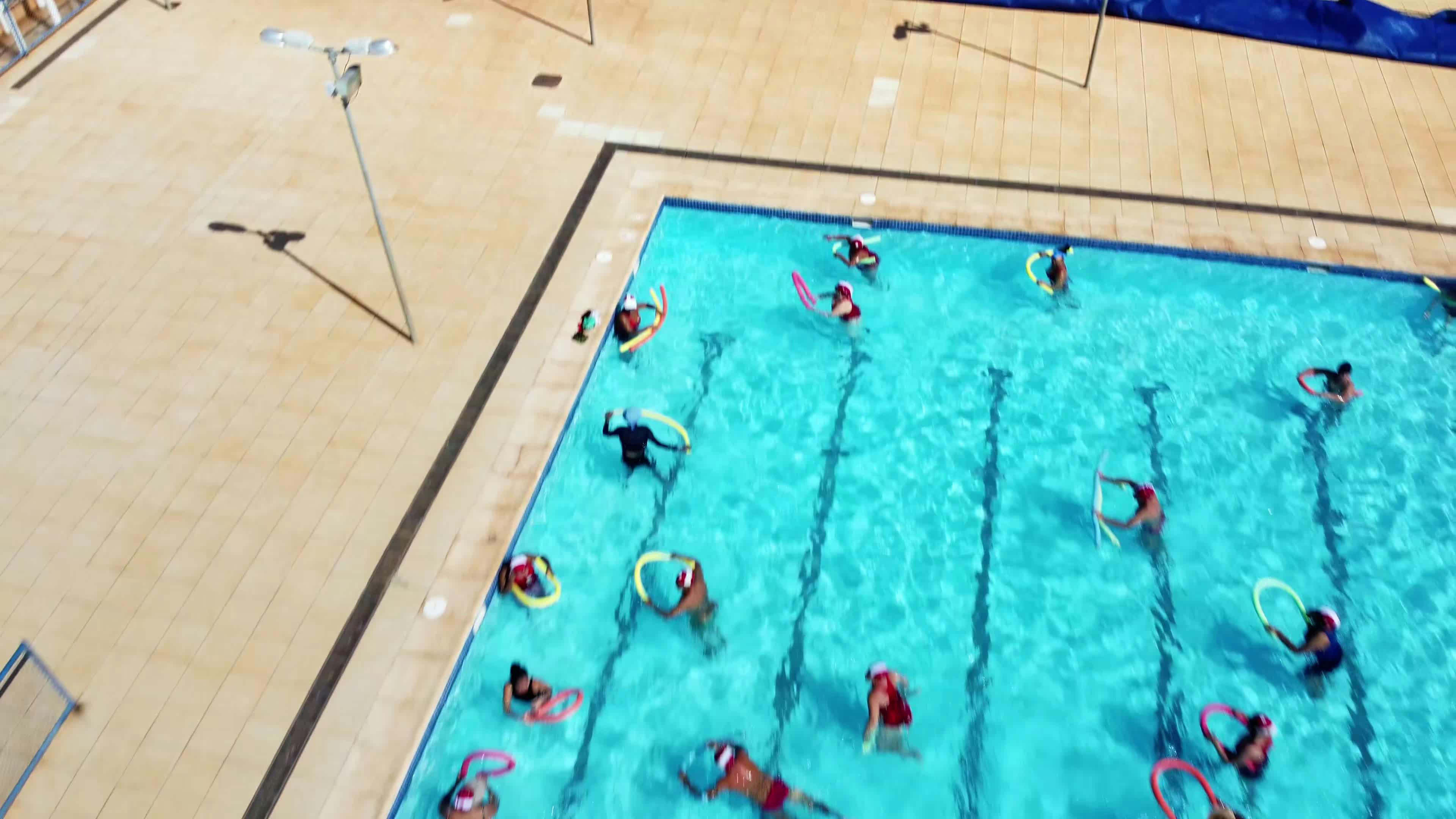 An aerial view of a swimming pool and a park Free Stock Video Footage ...