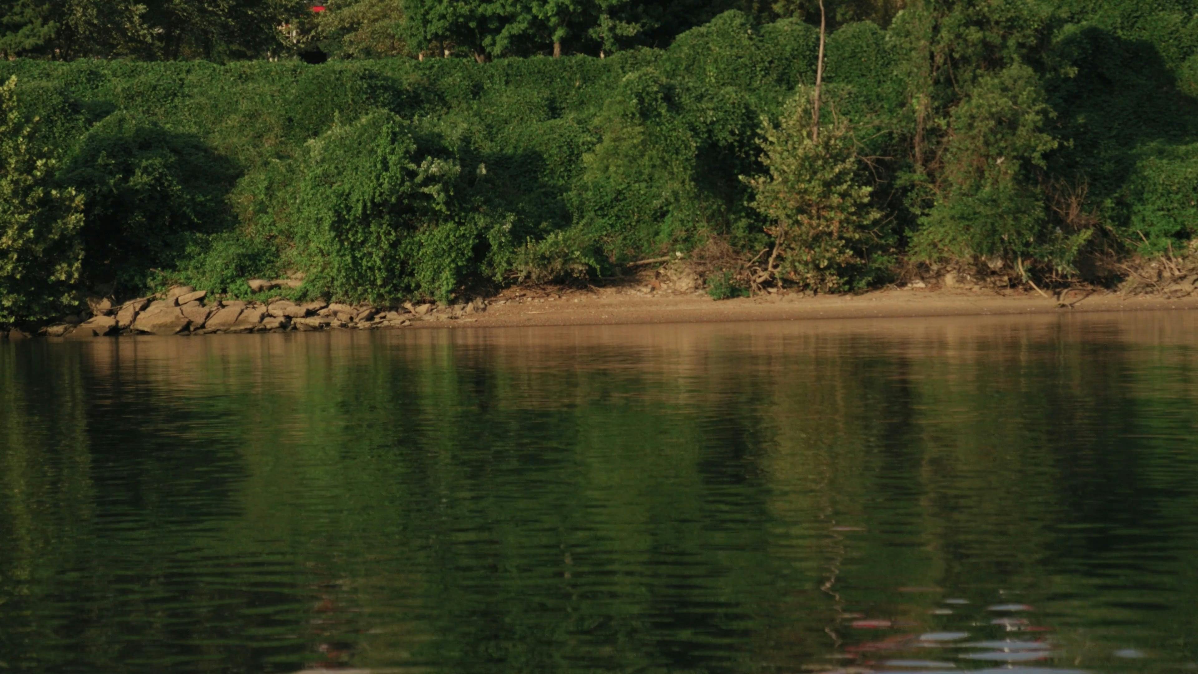 A Large Cargo Ship Being Pushed By A Motorized Power Barge In A Lake ...