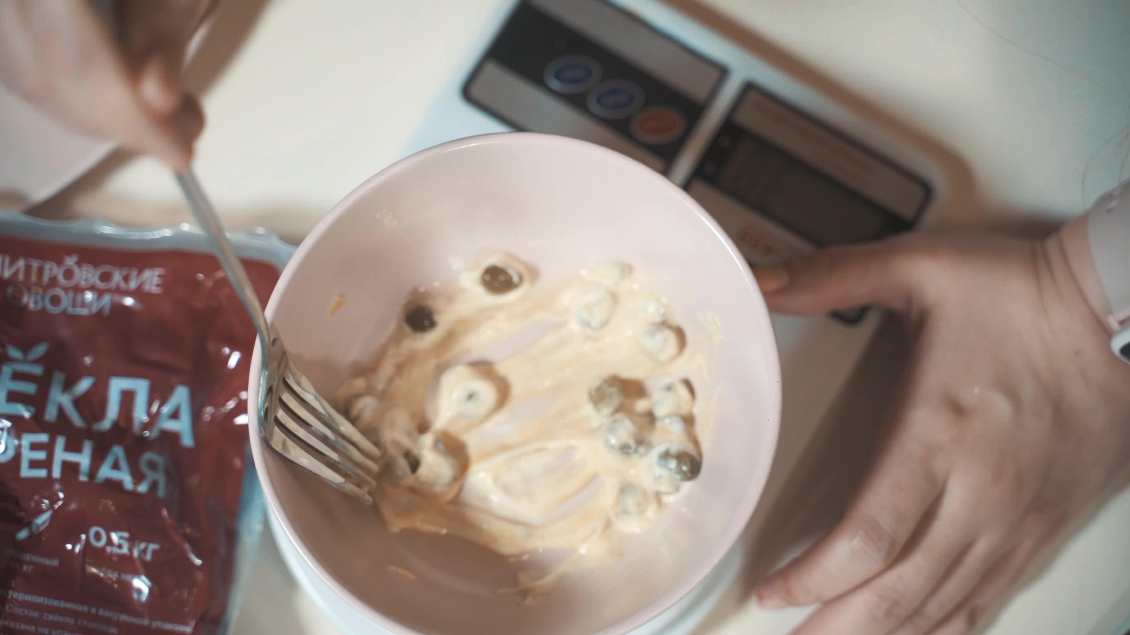 A person is using a fork to stir some food Free Stock Video Footage ...