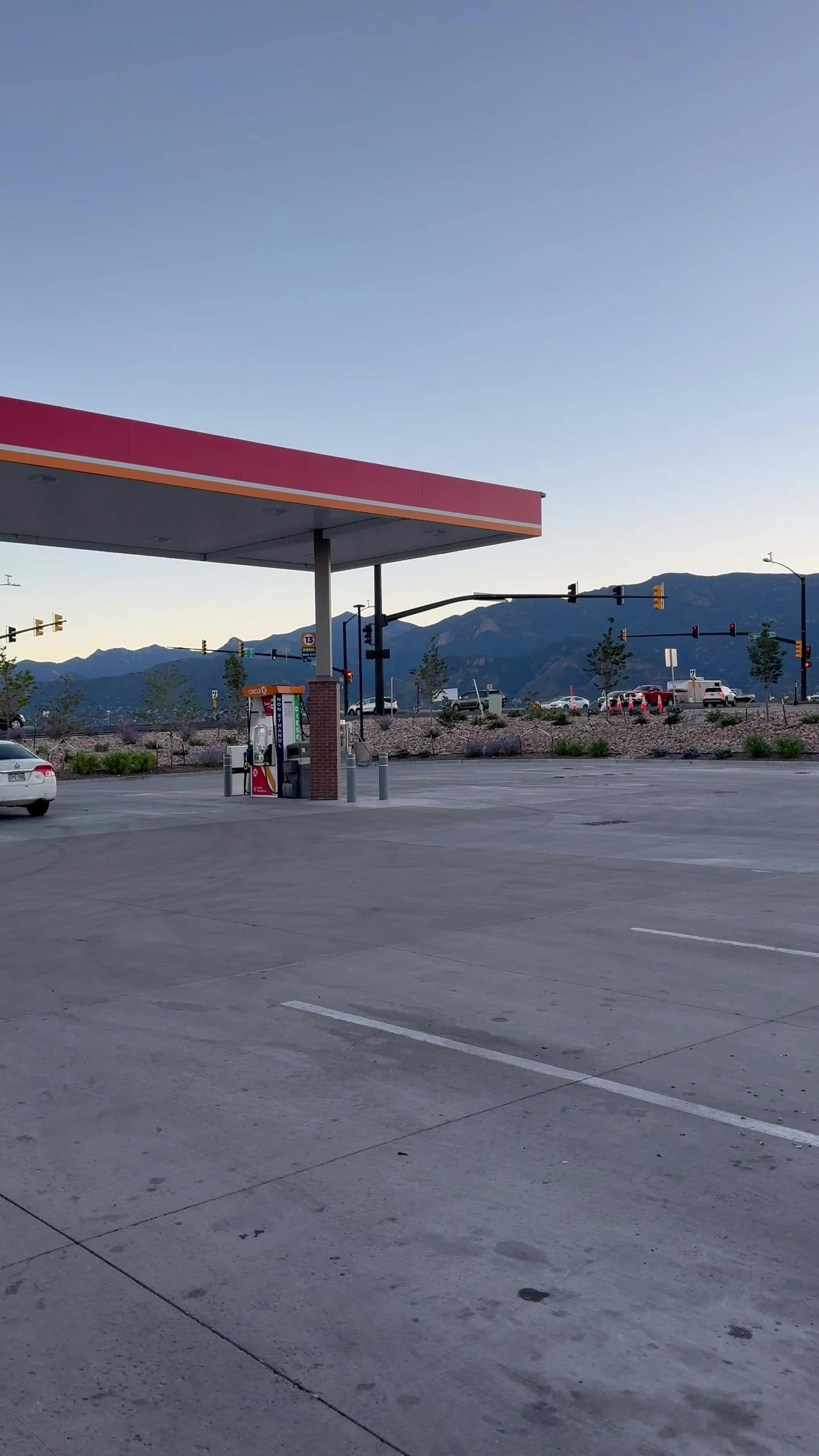 A gas station with a car parked in front of it Free Stock Video Footage ...