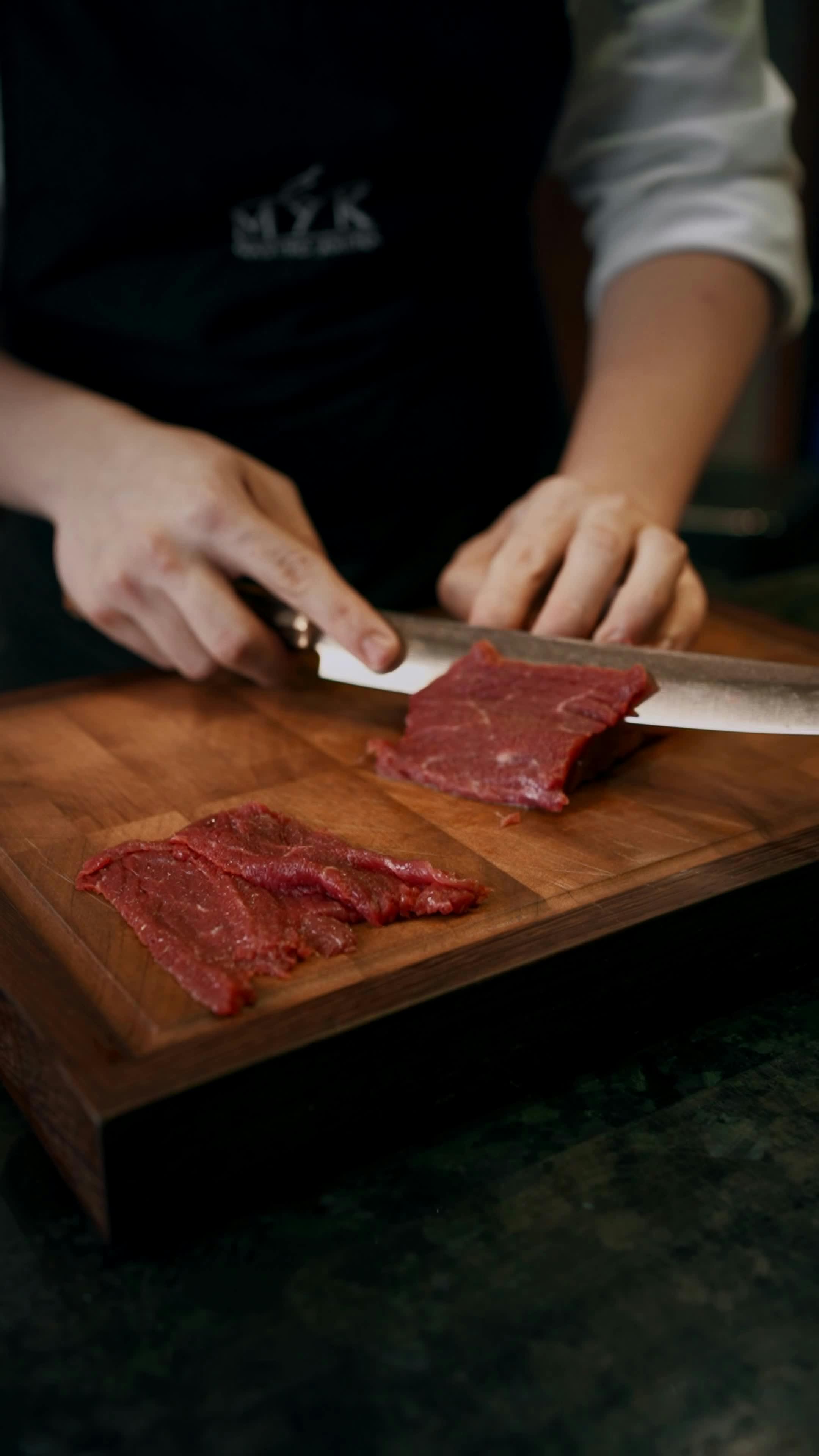 Person Cutting Beef Into Slices Free Stock Video Footage, Royalty-Free ...