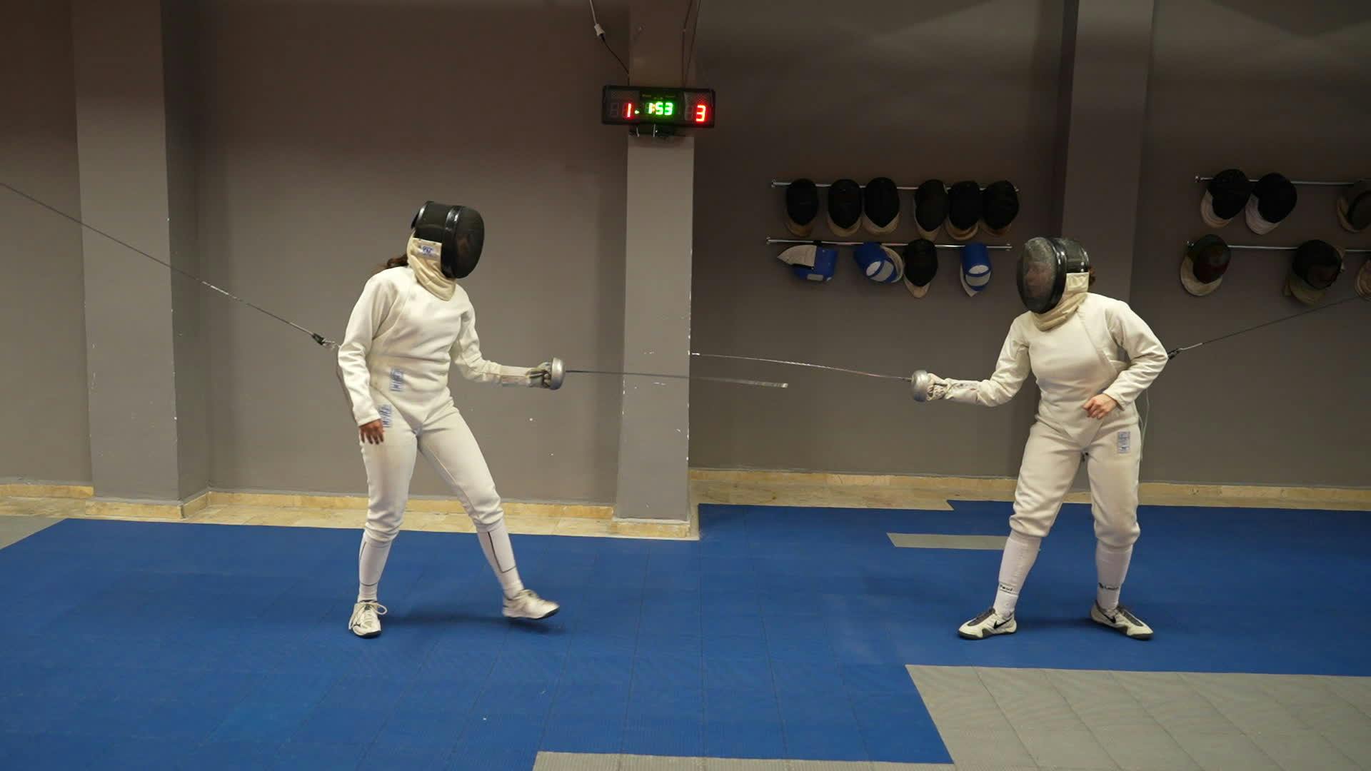 Intense Indoor Fencing Duel in Gym Setting Free Stock Video Footage ...