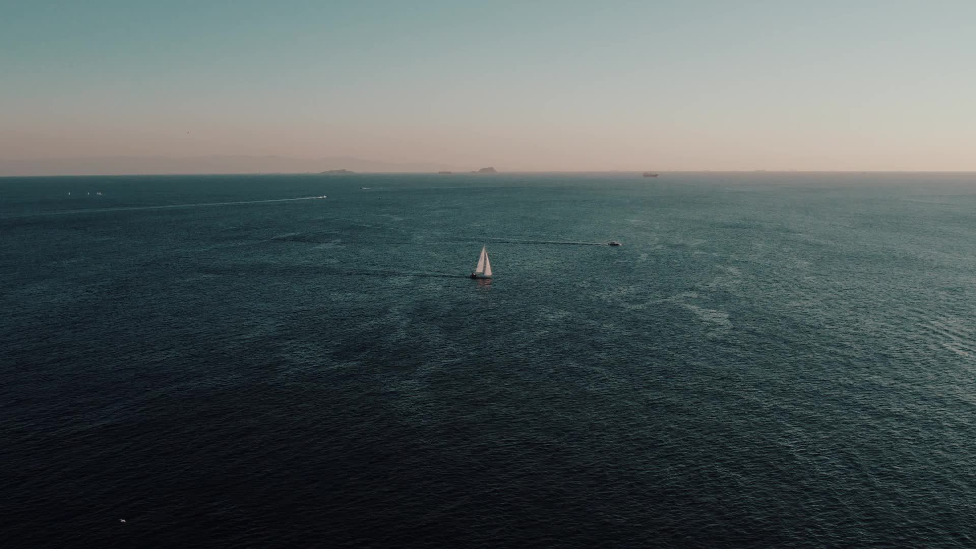 Aerial View of Sailboat on Open Sea at Sunset Free Stock Video Footage ...