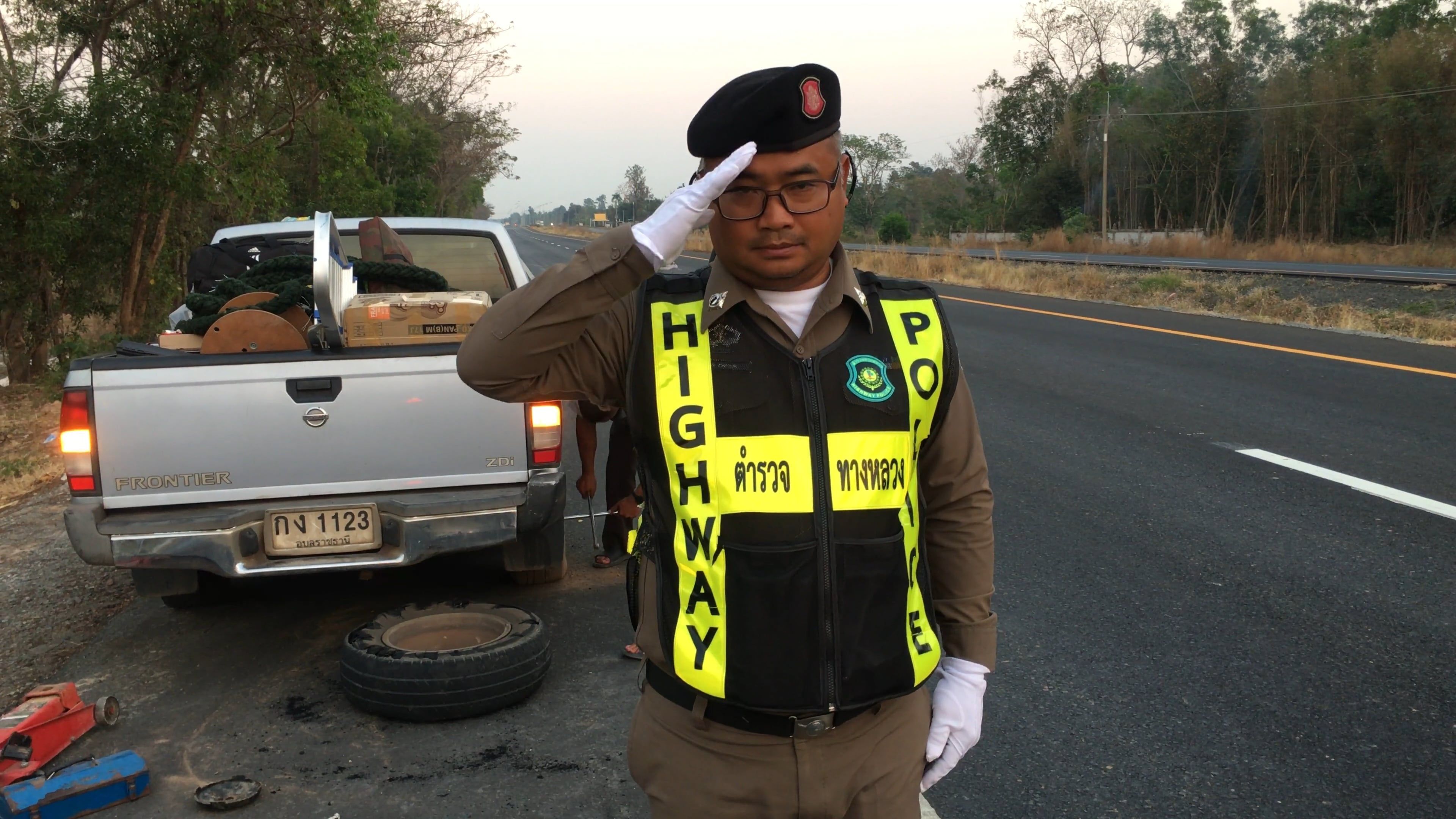 Men Changing A Flat Tire Assisted By Highway Police Free Stock Video ...