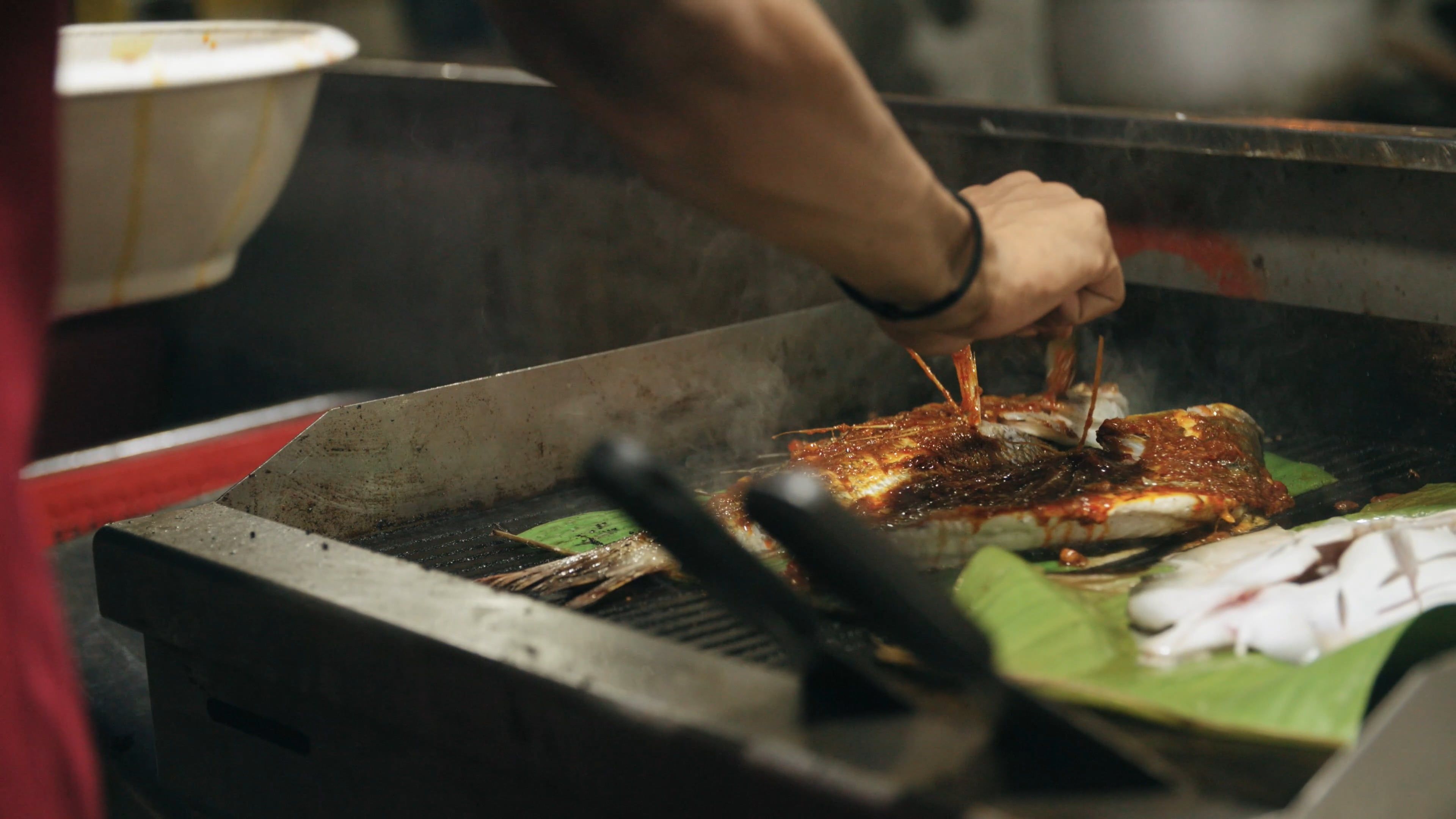 Grilling A Fish Over A Banana Leaves Free Stock Video Footage, Royalty ...
