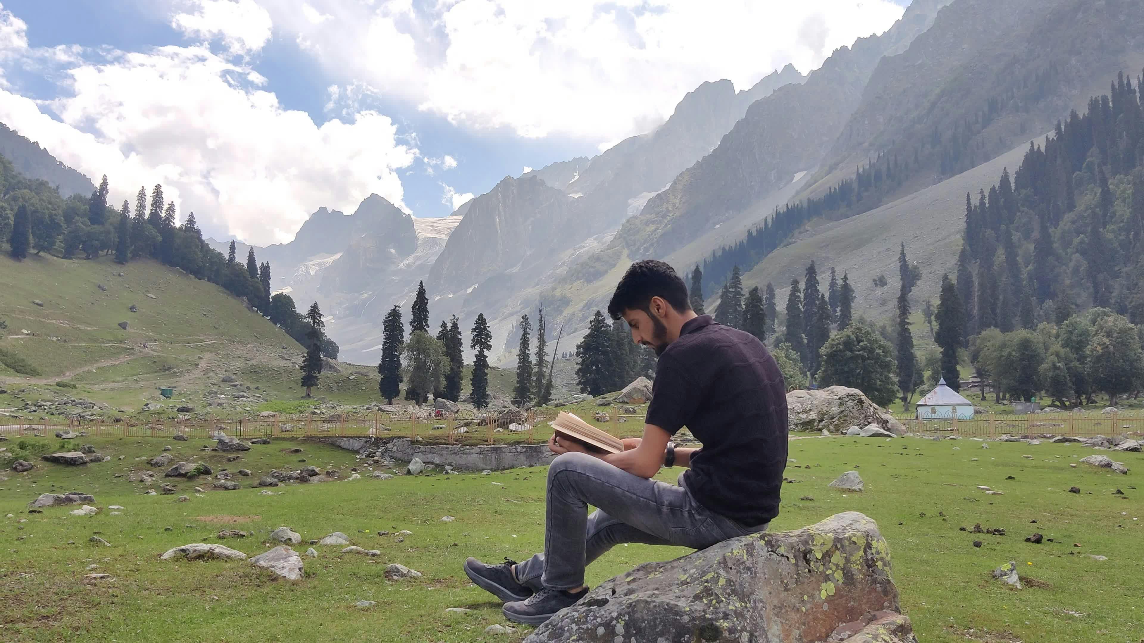 Peaceful Reading in Breathtaking Mountain Scenery Free Stock Video ...