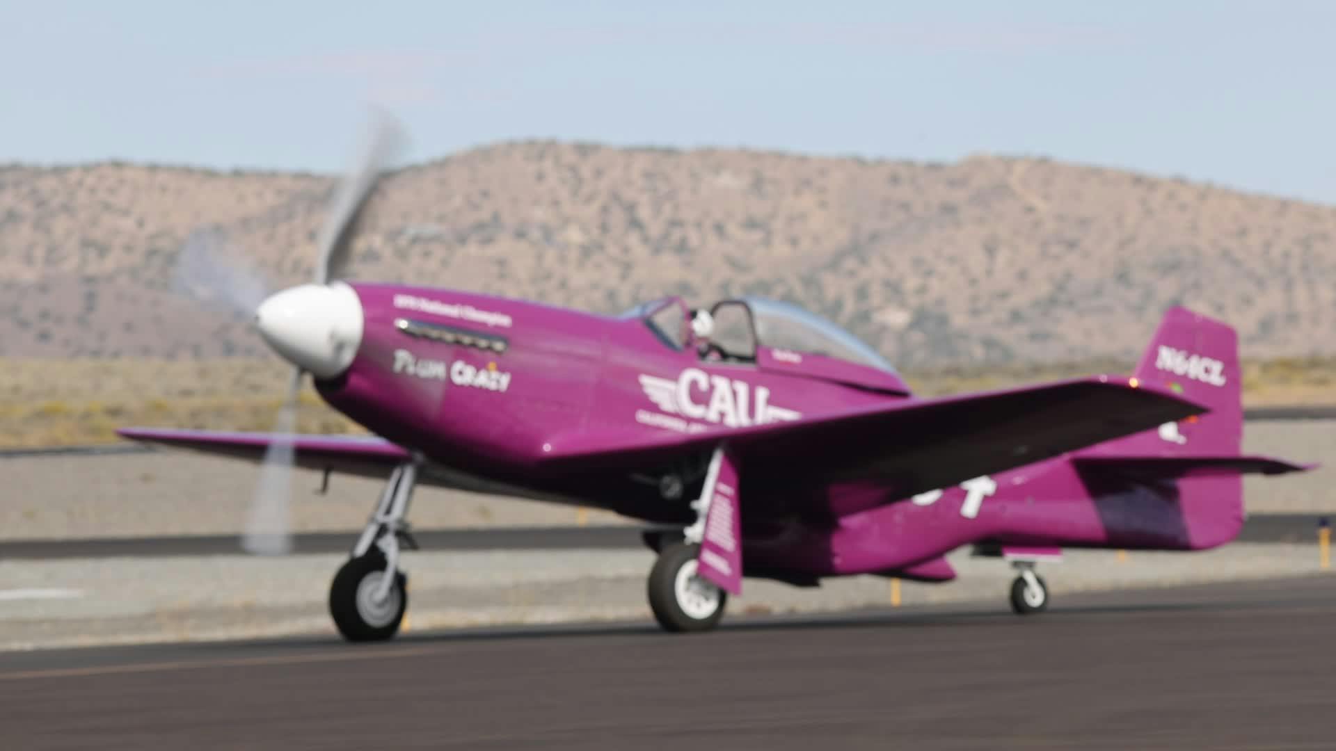 Vibrant Purple Vintage Aircraft on Runway Free Stock Video Footage ...