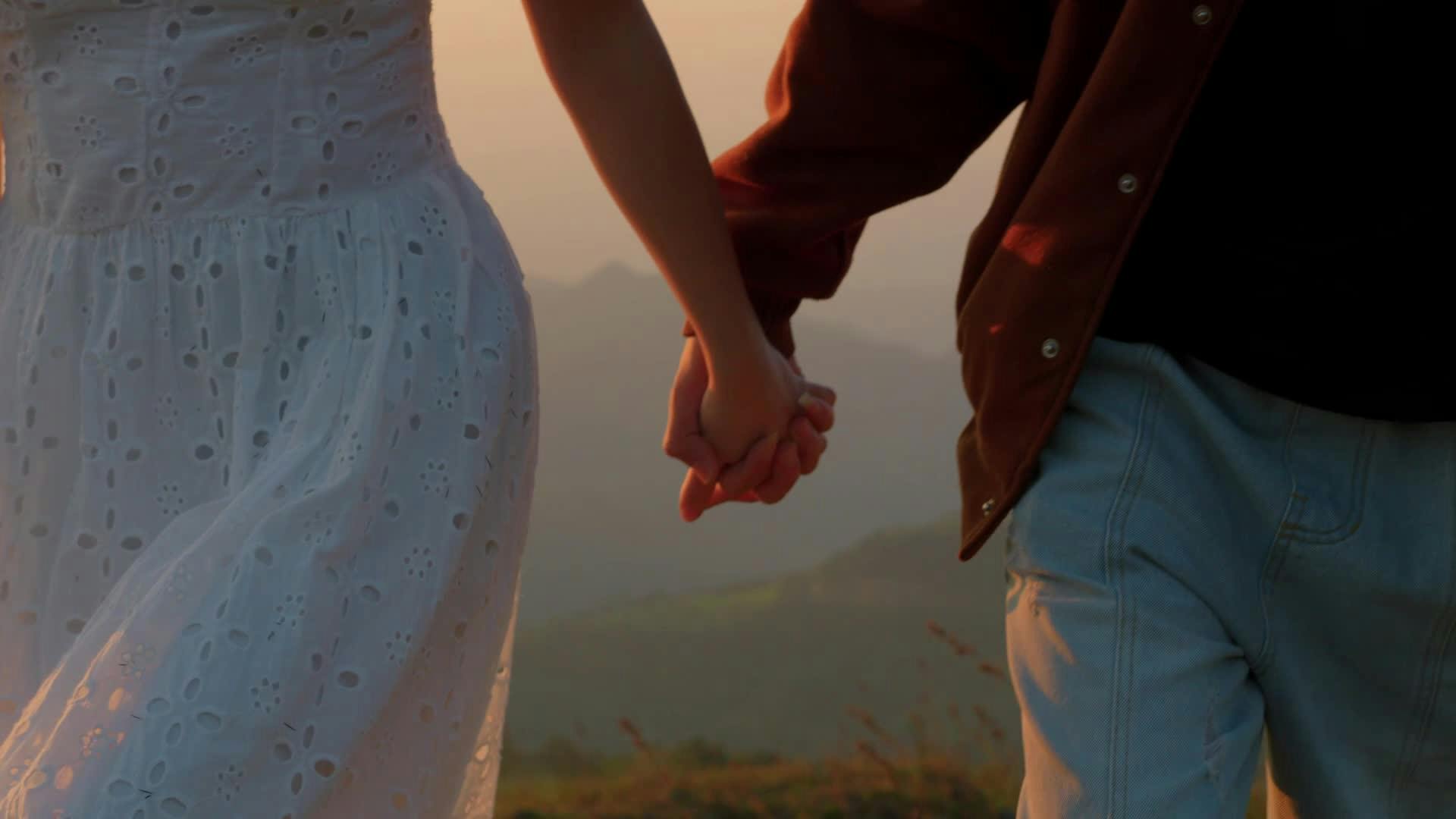 Romantic Couple Holding Hands at Sunset Free Stock Video Footage ...